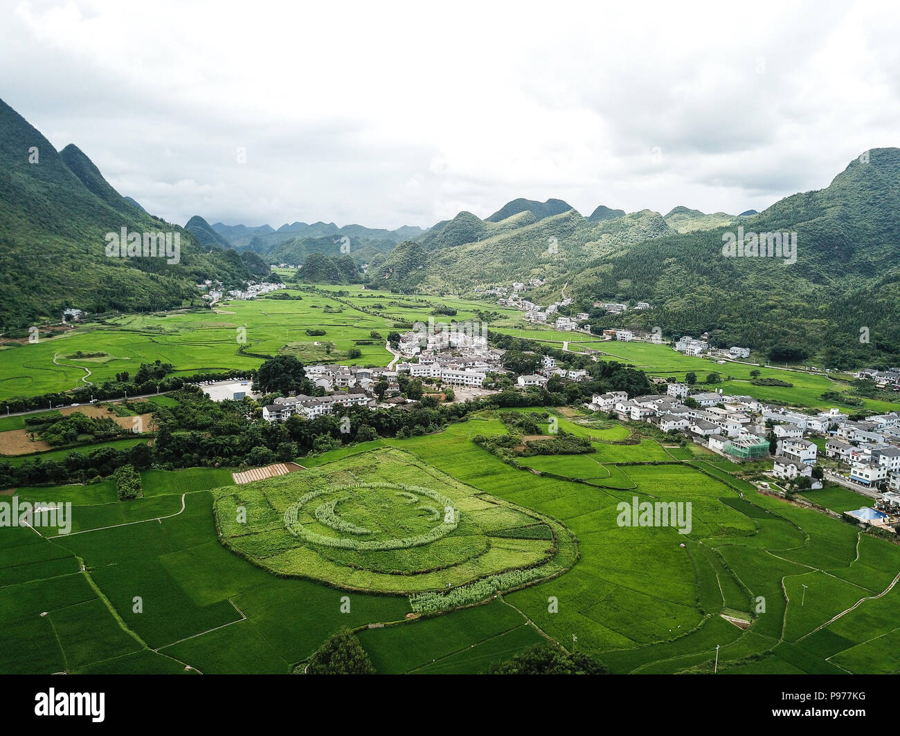 Xingyi. 15th July, 2018. This aerial photo taken on July 15, 2018 shows ...