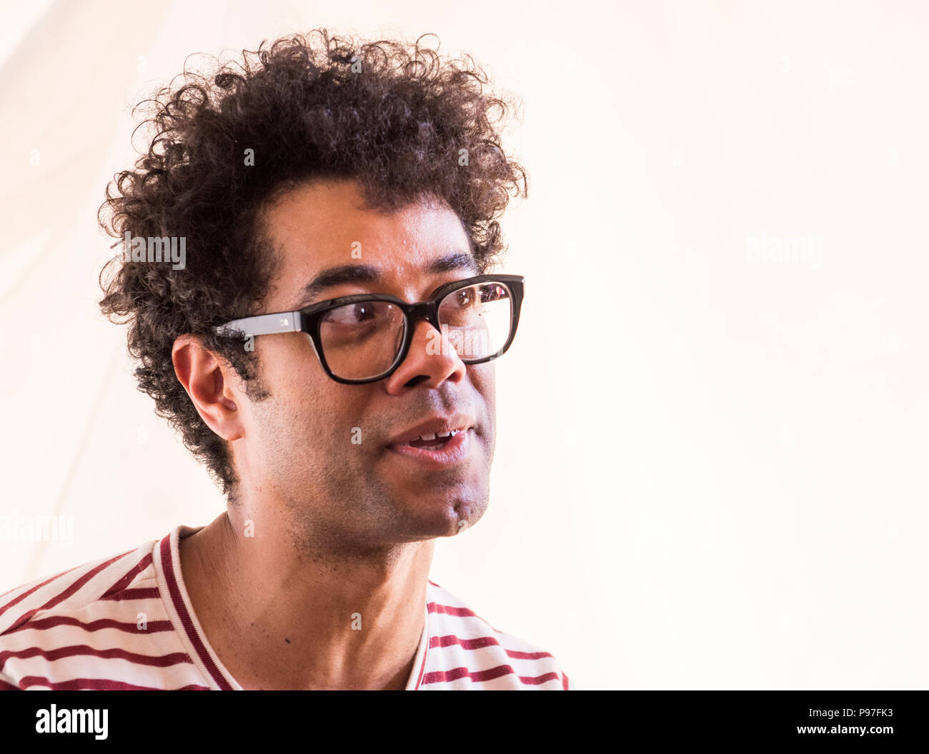 Close up of Richard Ayoade signing books at Latitude Festival, Henham ...