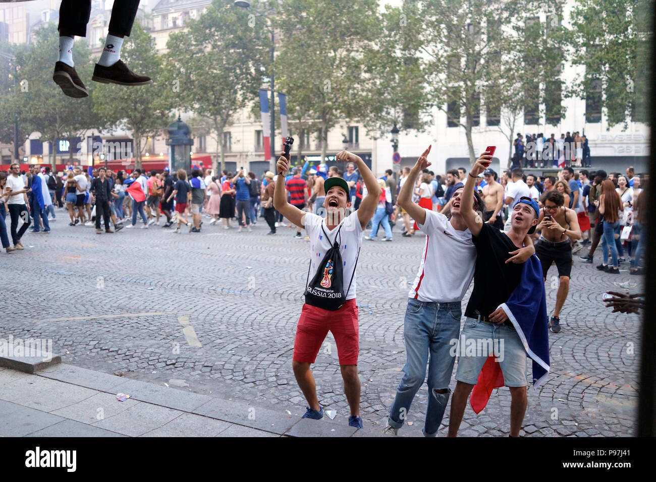 Paris, France. 15 July 2018. Football fans celebrate World Cup victory ...