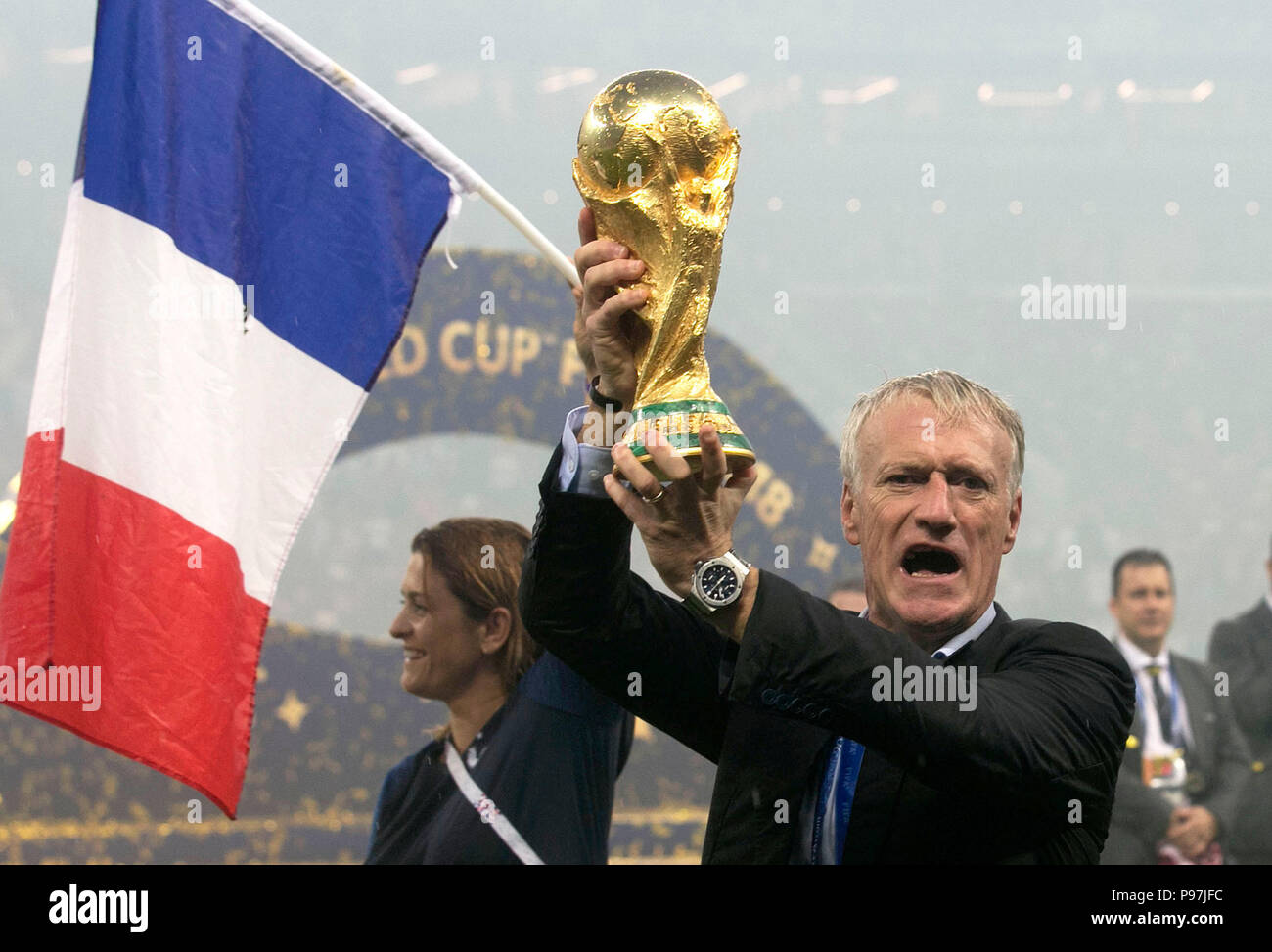 France head coach Didier Deschamps poses with the trophy after his team ...