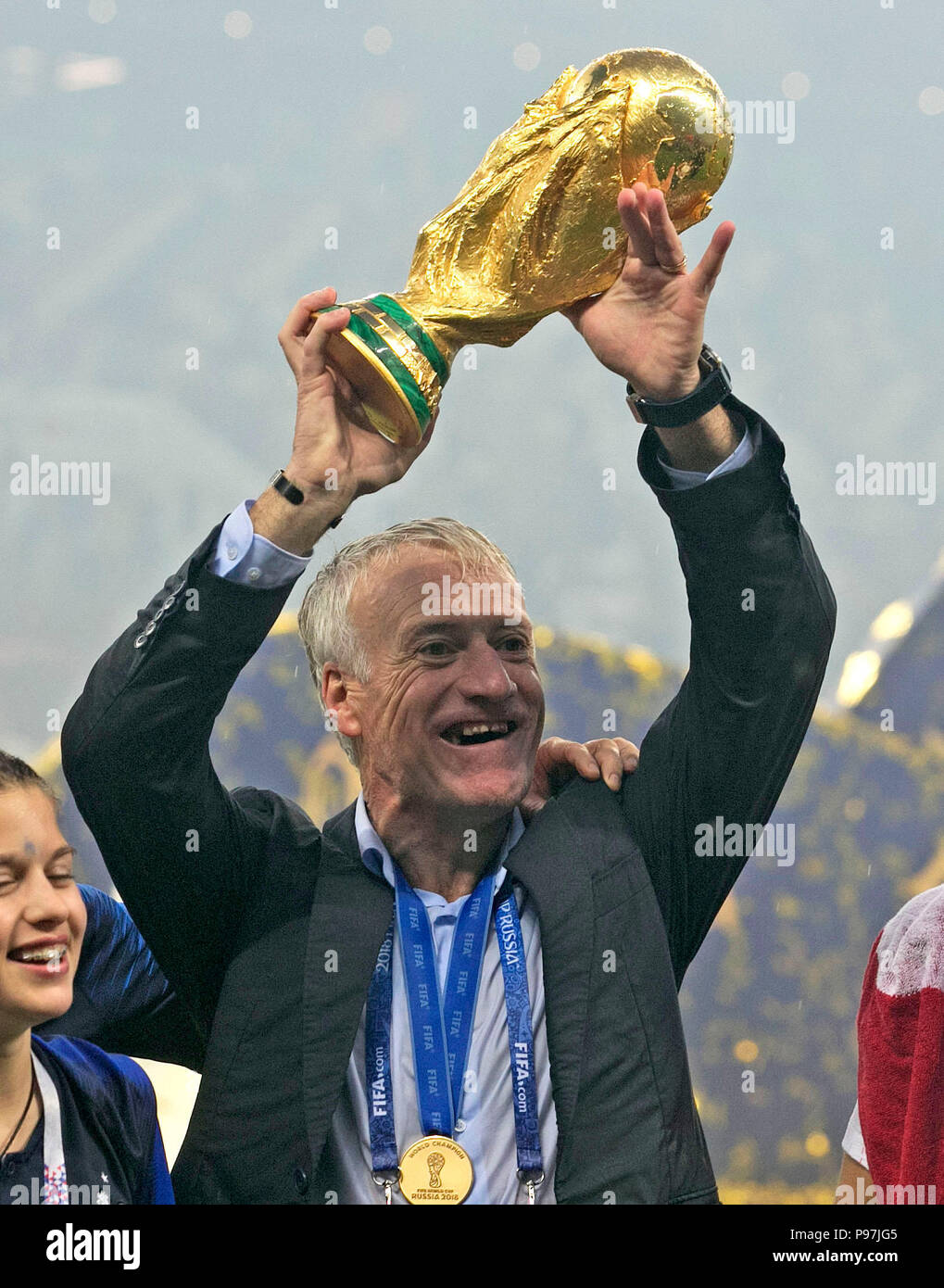 France head coach Didier Deschamps poses with the trophy after his team ...