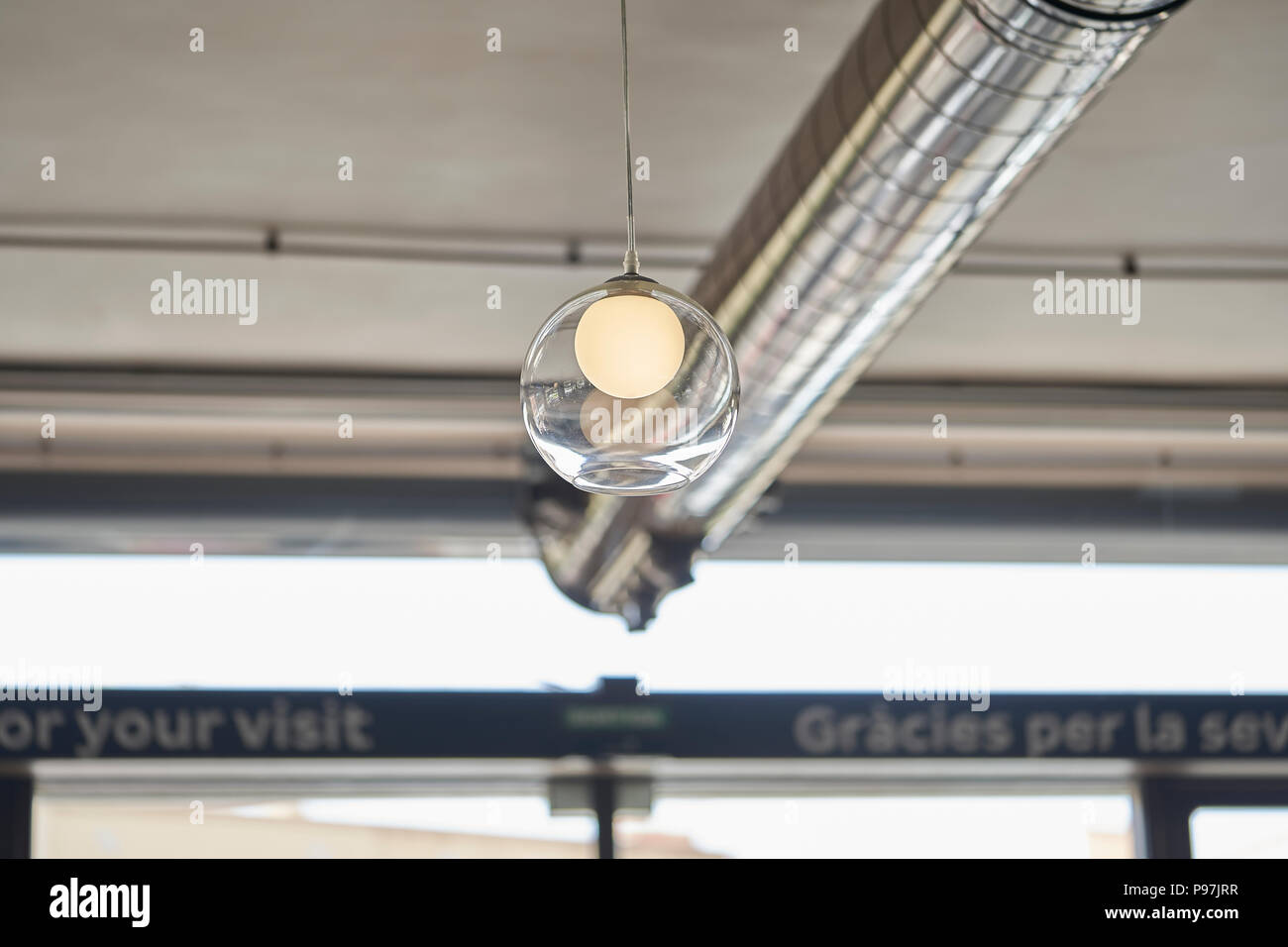 Modern light bulb in a room Stock Photo - Alamy