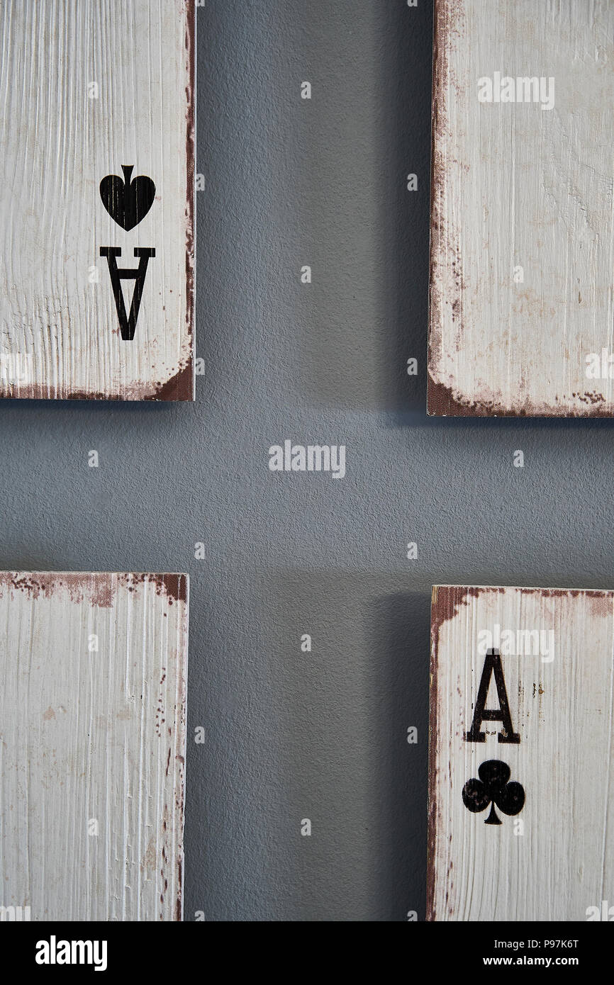 Wooden playing cards in a wall Stock Photo - Alamy