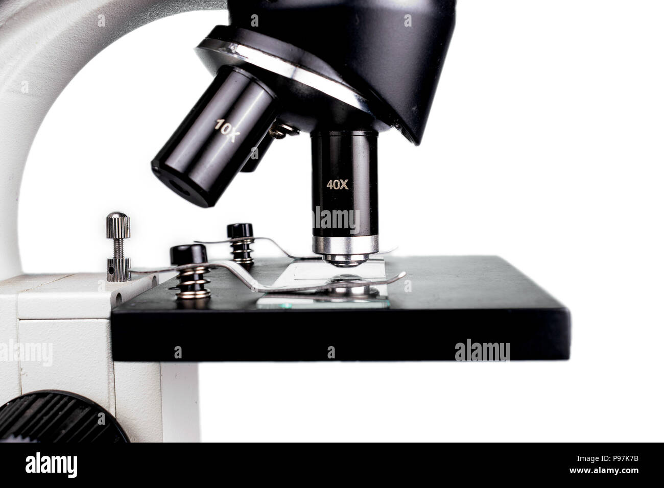 Microscope lenses, stage closeup, white background Stock Photo - Alamy