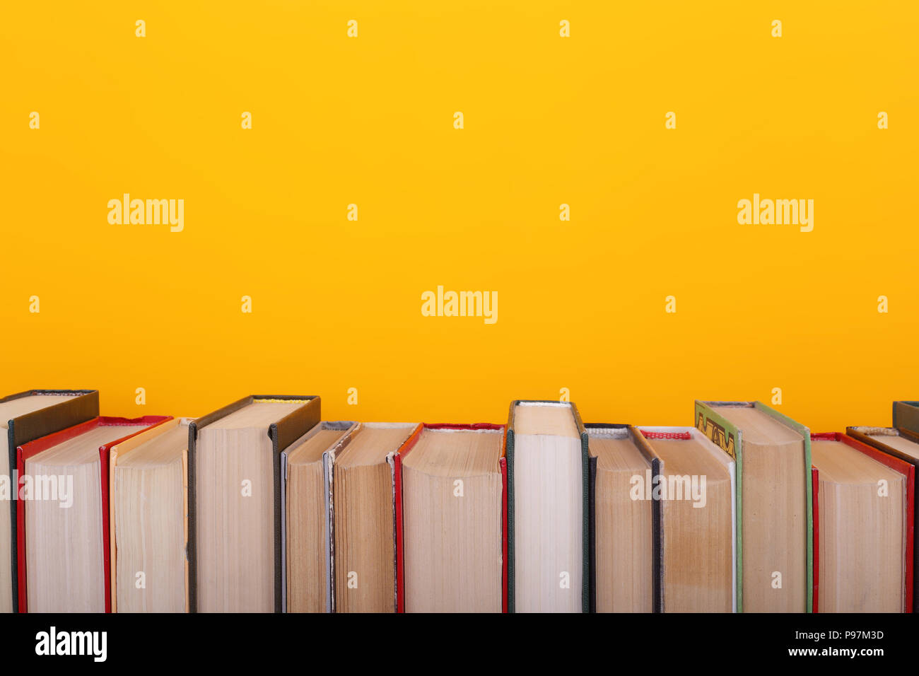 Science and education - horizontal pile group of colorfull books on a ...