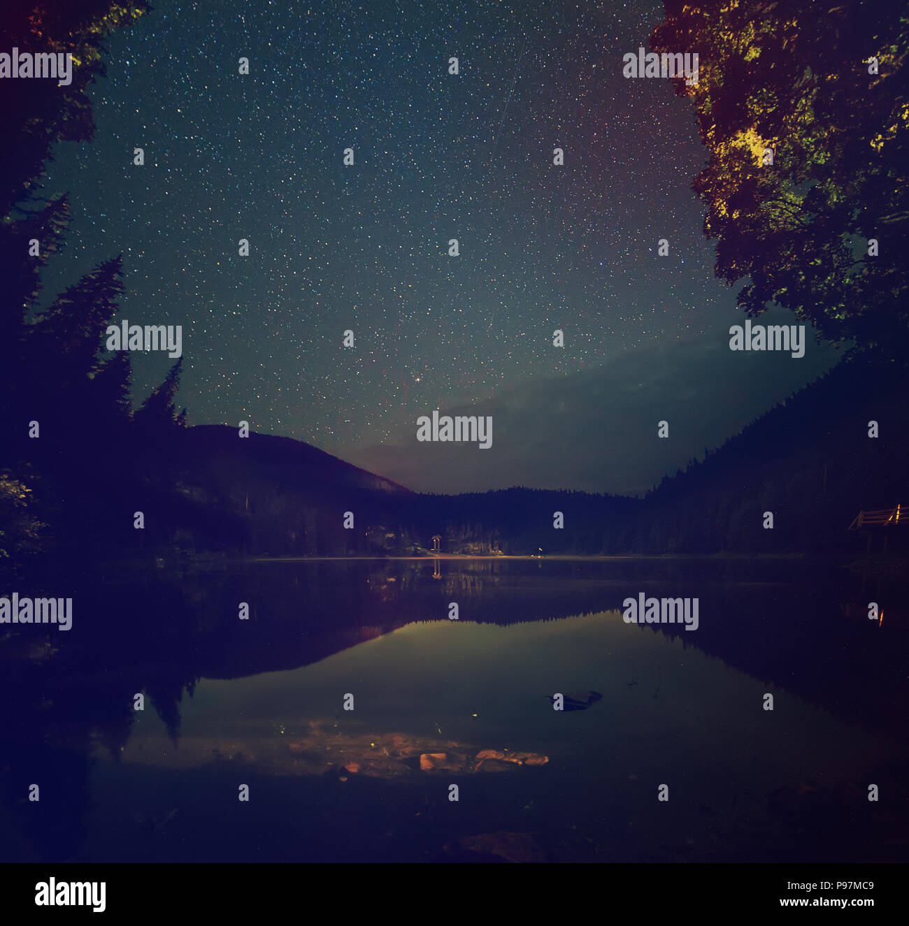Mountain lake at night Stock Photo - Alamy