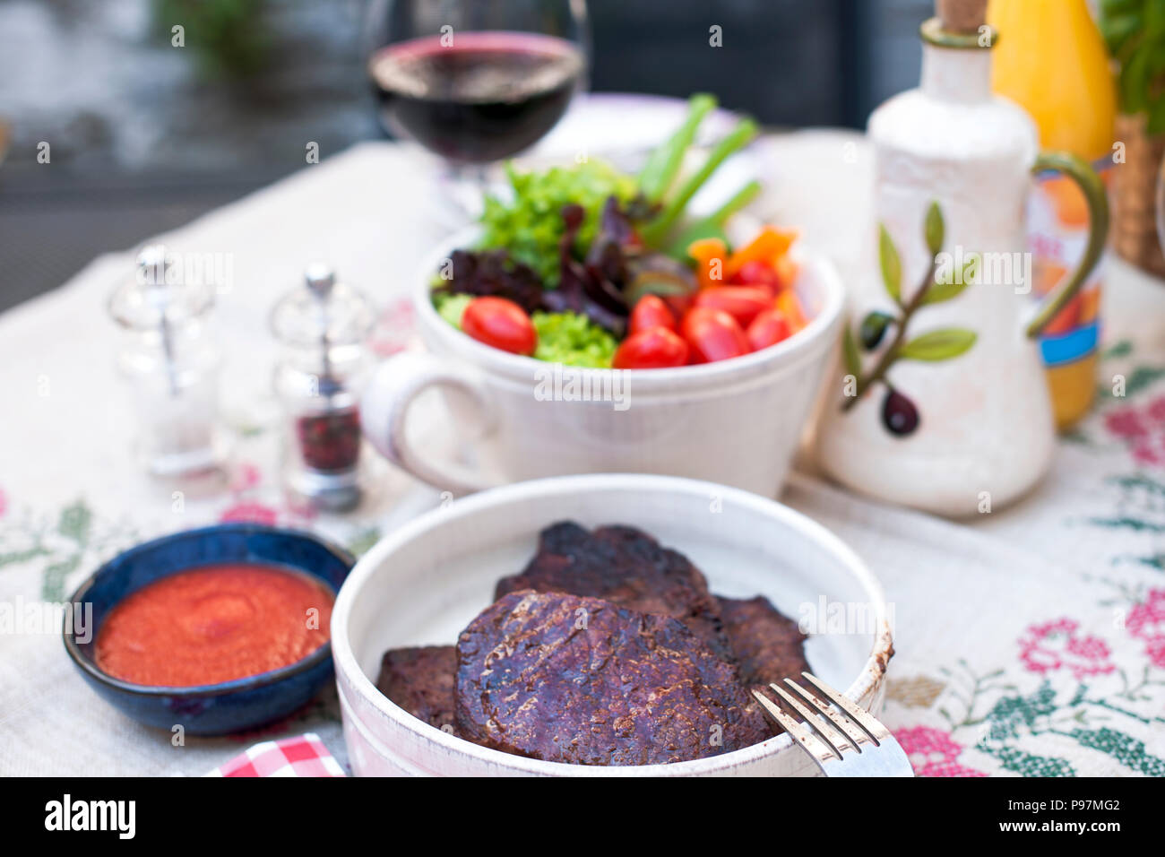 Lunch in the open air, picnic with meat and salad. Vegetables and beef ...