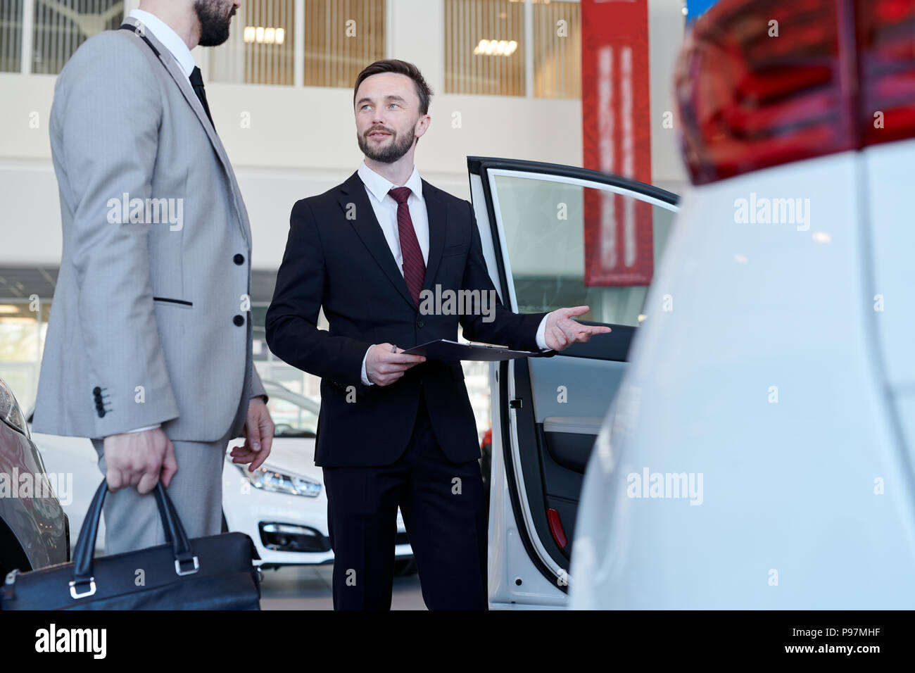 Professional salesman and client Stock Photo - Alamy