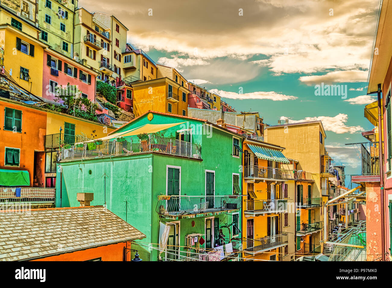 colorful houses in the street of Riomaggiore, village of Cinque Terre ...