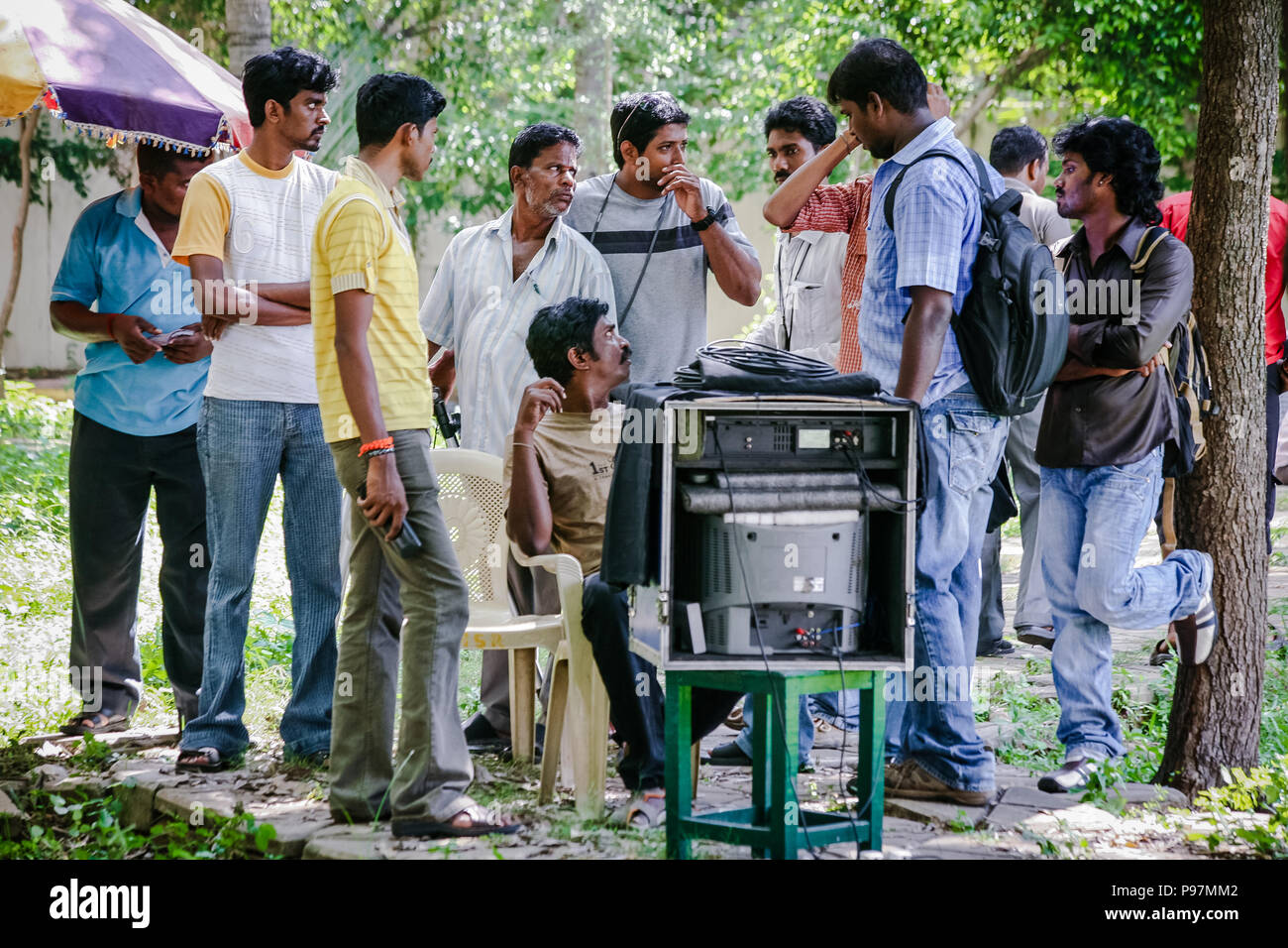 Film crew team filming movie scene on outdoor location. Group cinema ...