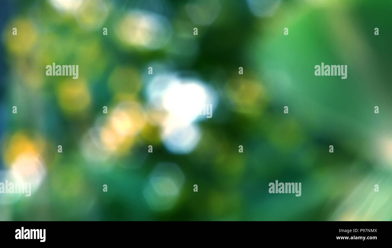 Natural background in green and yellow tones with sun rays Stock Photo ...