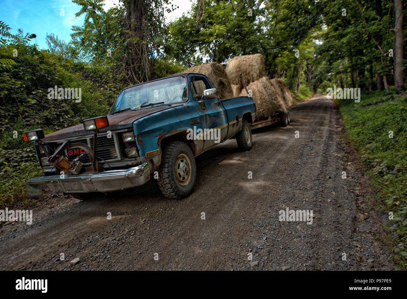 UNITED STATES - July 3, 2017: A hay truck moves slowly down Western ...