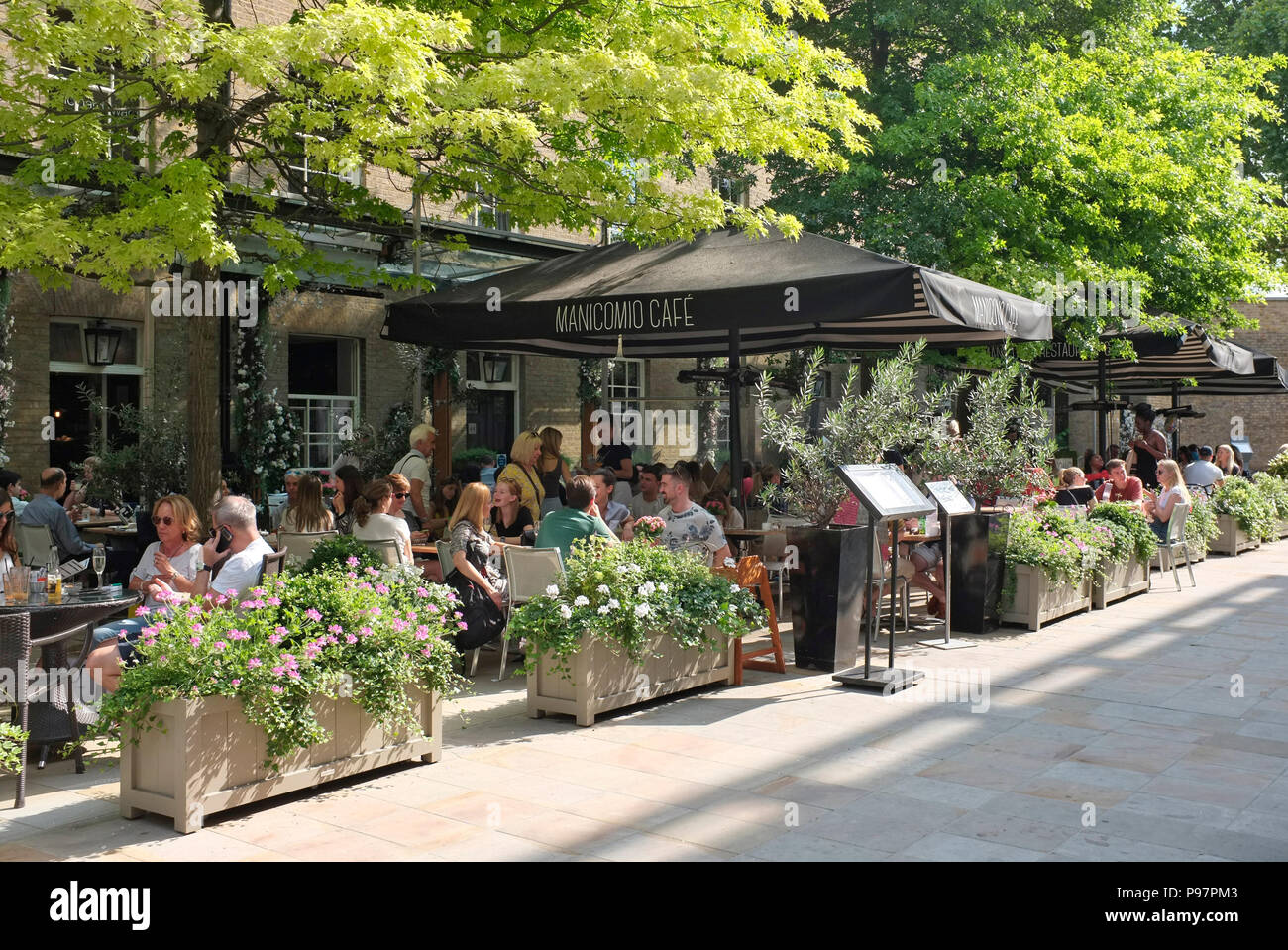 people dining al fresco during the 2018 heatwave on the terrace of ...