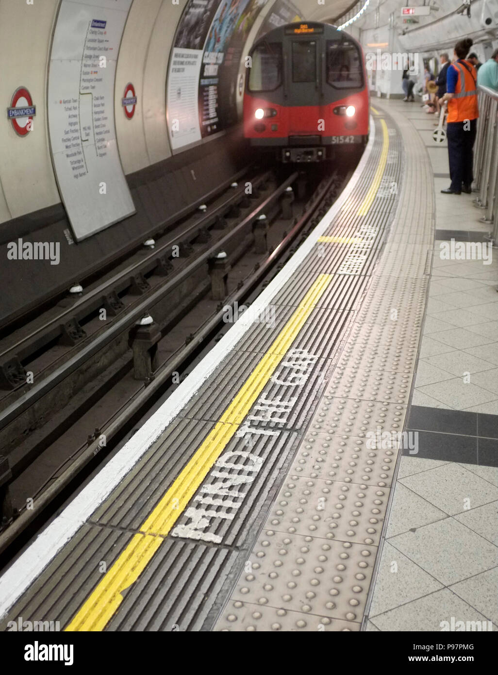 a tube train arrives into the platorm on the london underground Stock ...