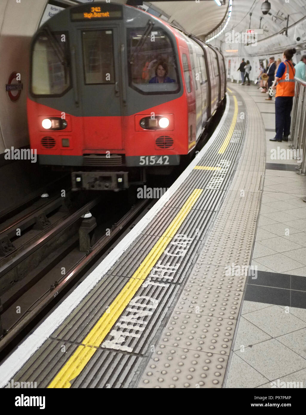 a tube train arrives into the platorm on the london underground Stock ...
