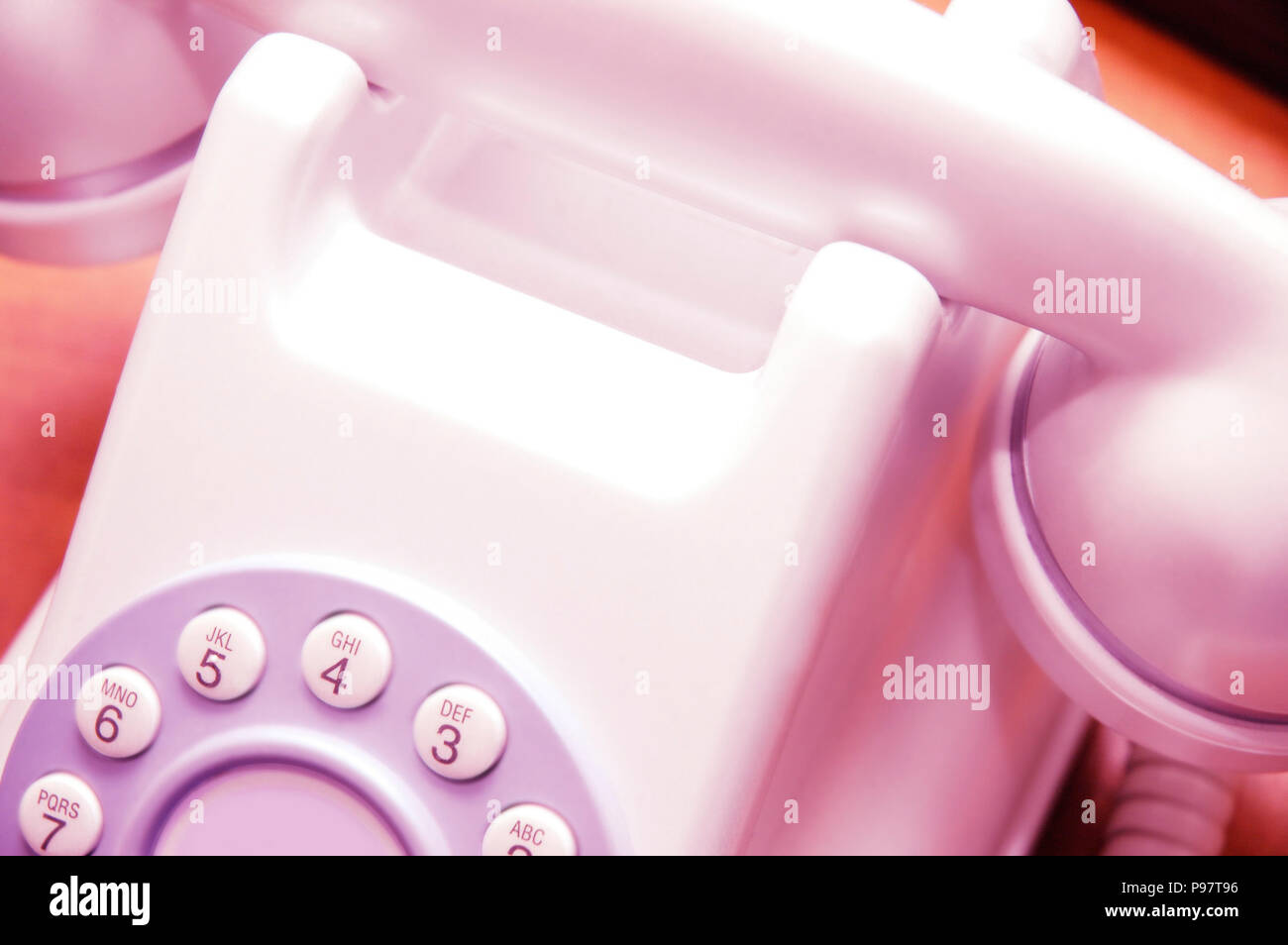 Close view of retro inspired telephone, cross color effect Stock Photo ...