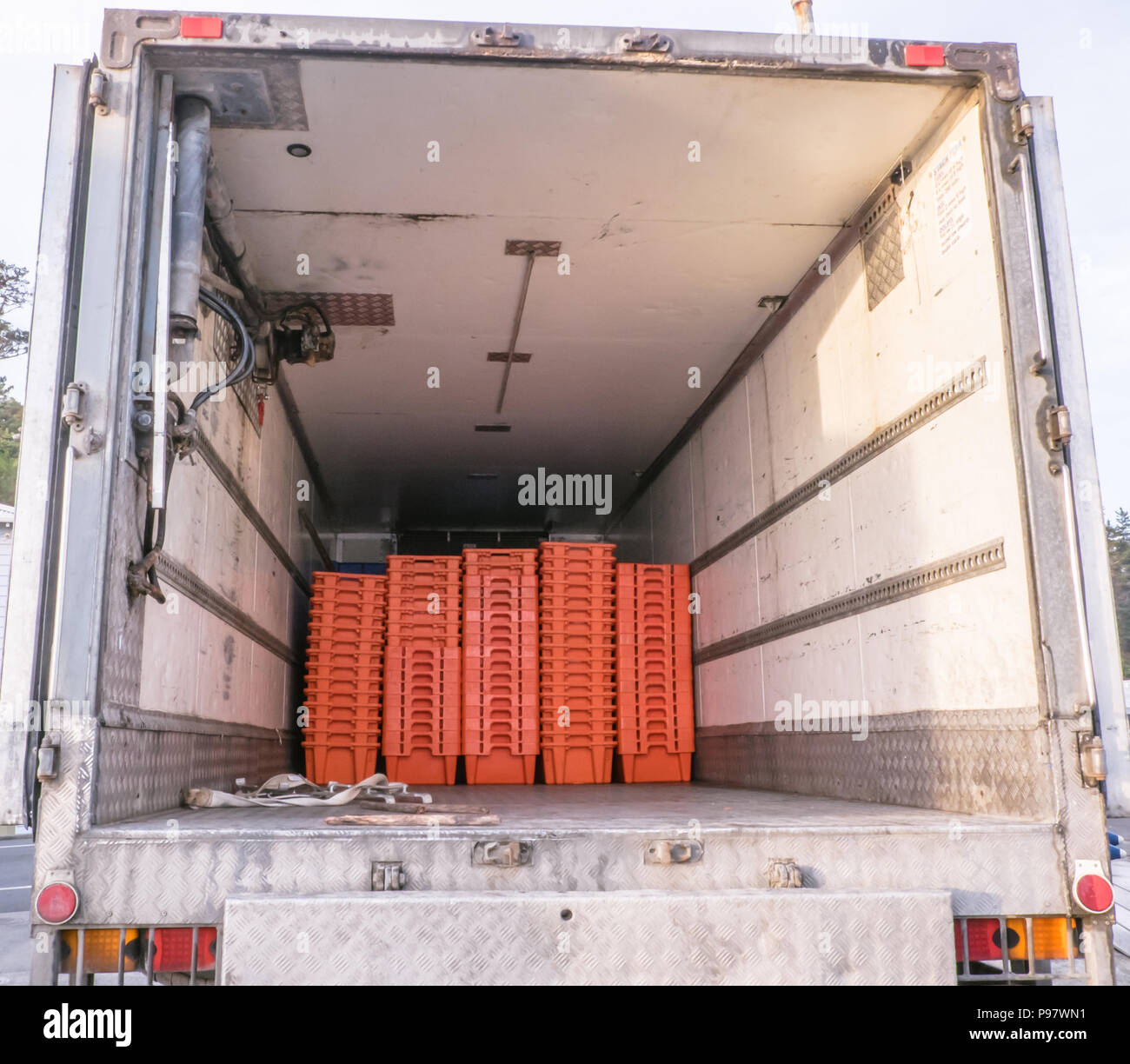 Fishing and seafood logistics industry - plastic fish crates inside ...