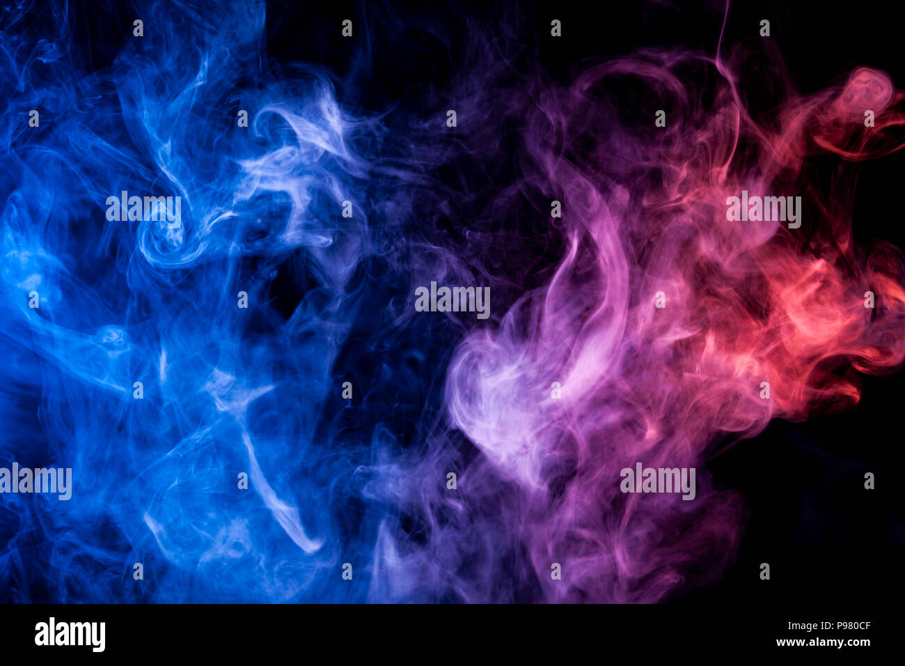 Colorful pink and blue smoke on a black isolated background. Background ...