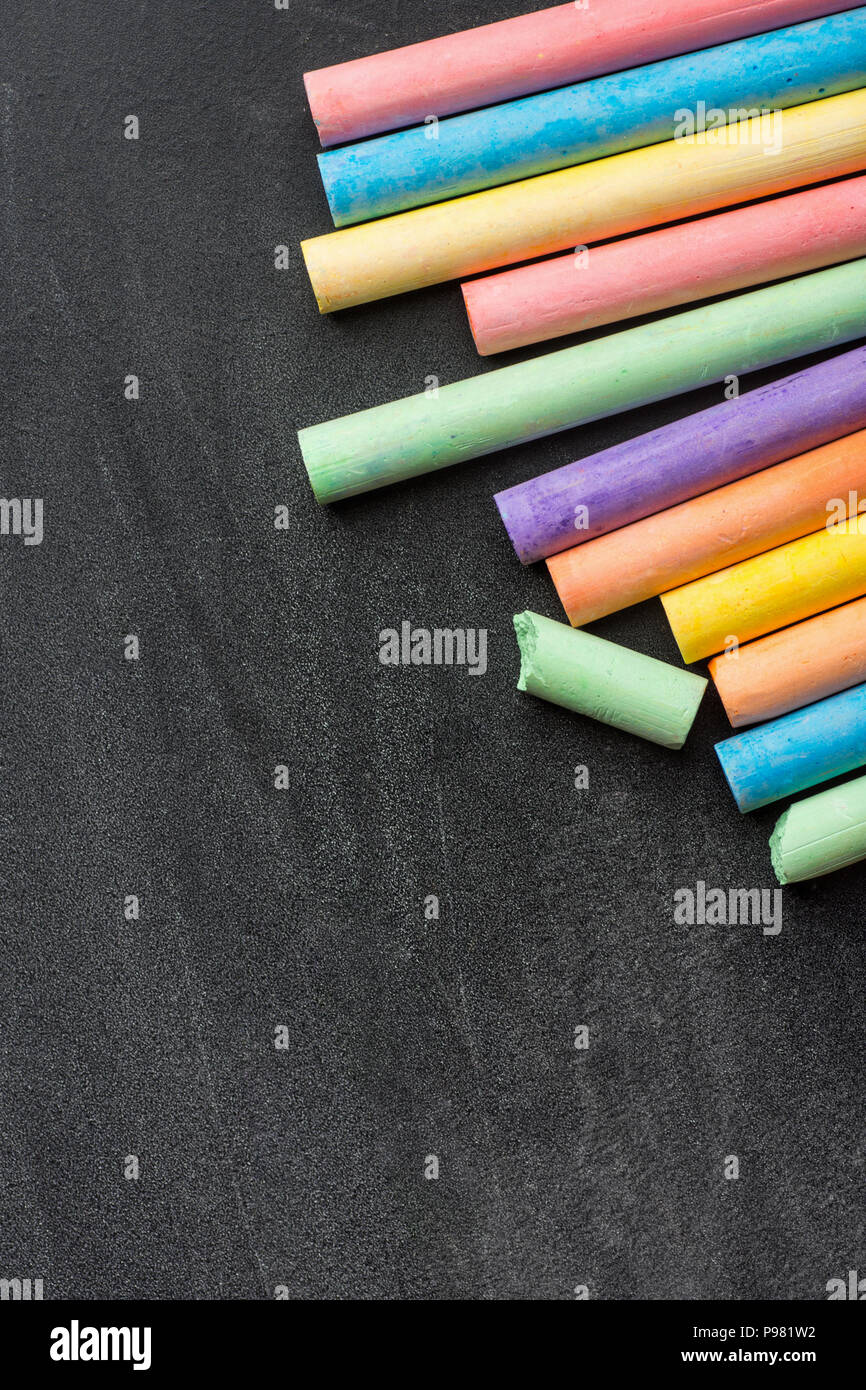 Row Pile of Multicolored Chalks Crayons on Dark Scratched Blackboard ...