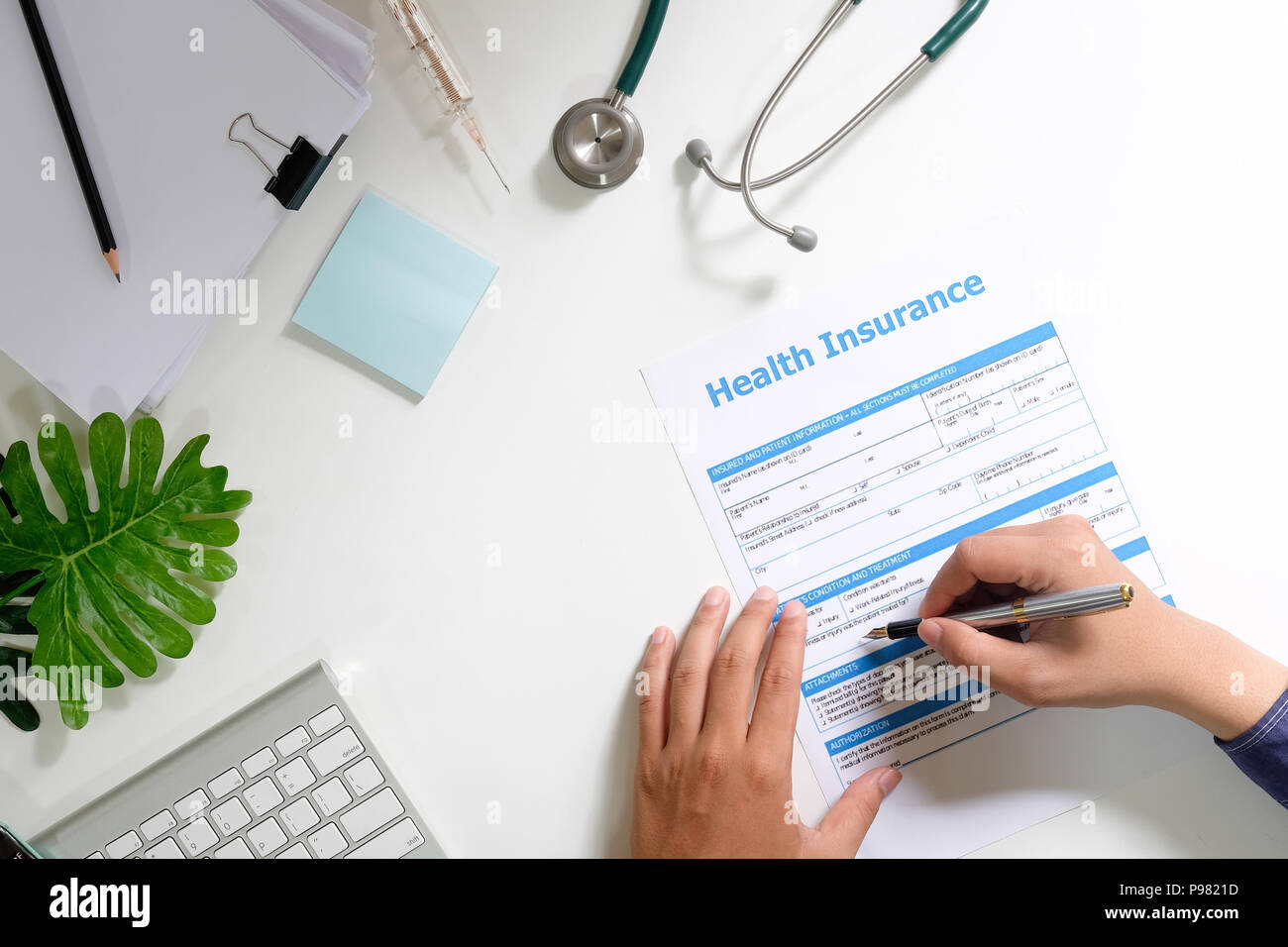 Health insurance concept, Man sign and reading Health insurance with ...