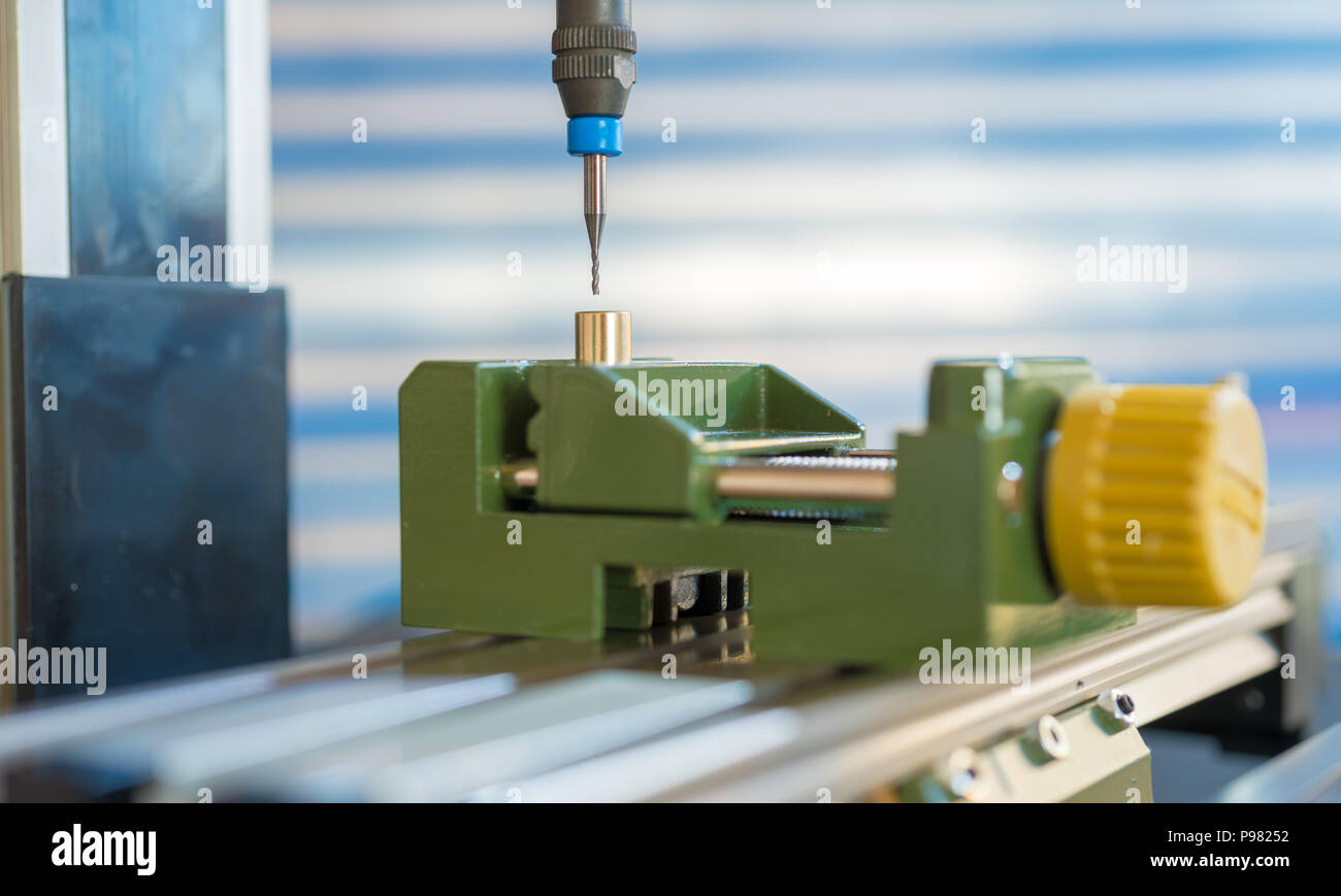 CNC milling machine processing plastic detail.Cutting plastic modern ...