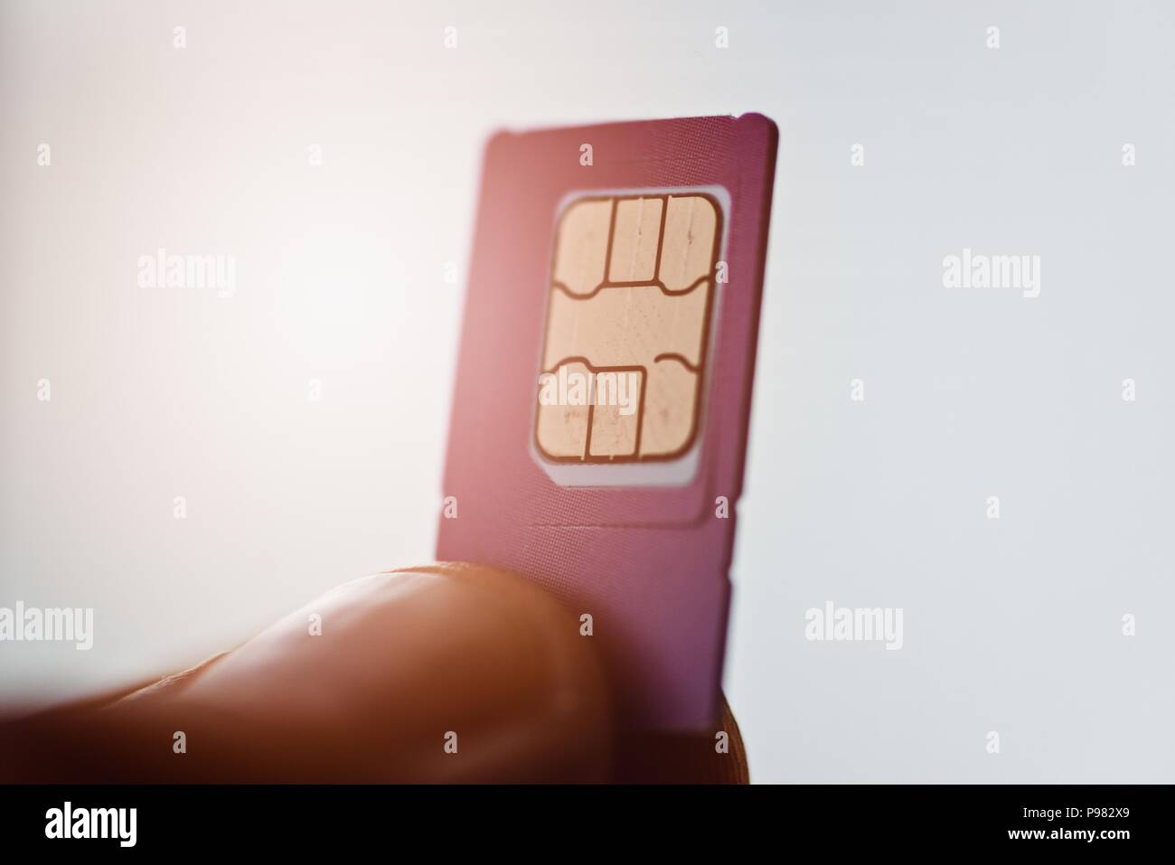 Micro sim telephone card with adapter Stock Photo - Alamy