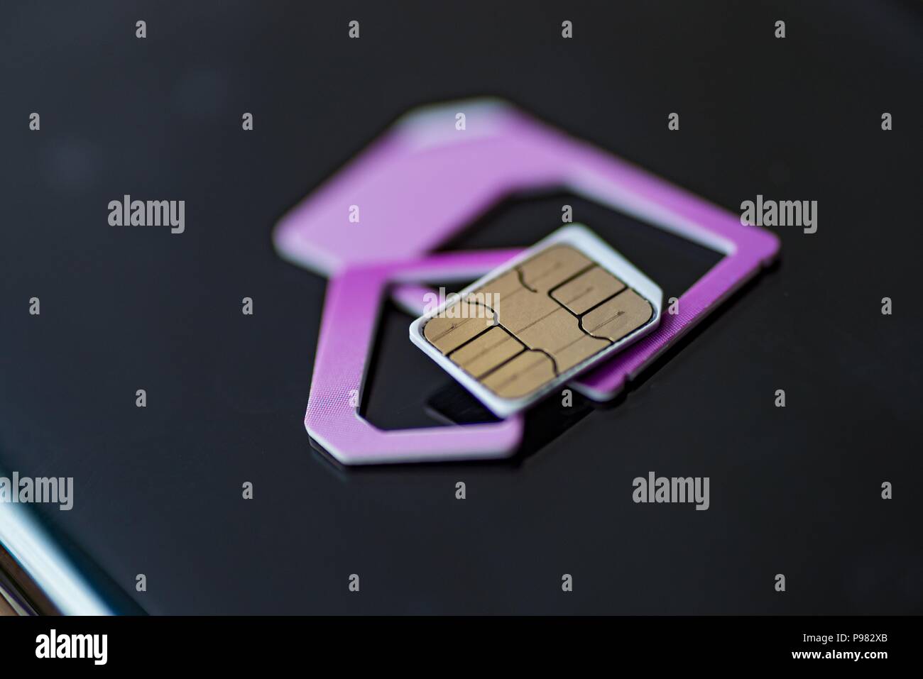 Micro sim telephone card with adapter Stock Photo - Alamy