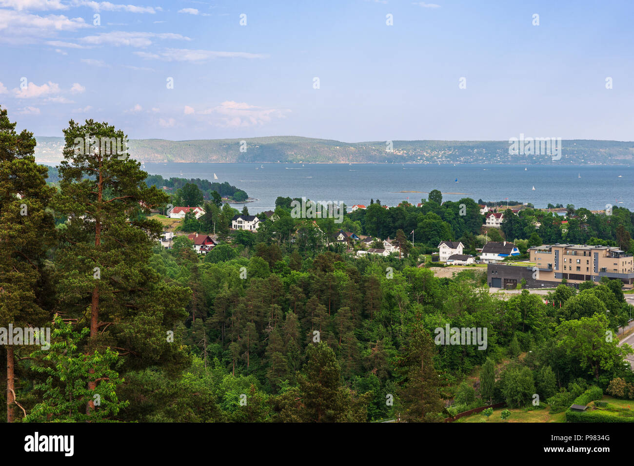 Summer evening at the Oslo fjord in Asker. At this sunny evening, many ...
