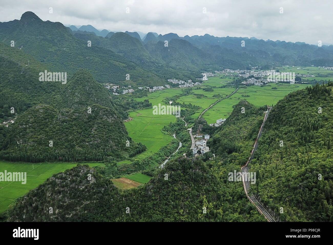 Xingyi. 16th July, 2018. Aerial photo taken on July 16, 2018 shows the ...
