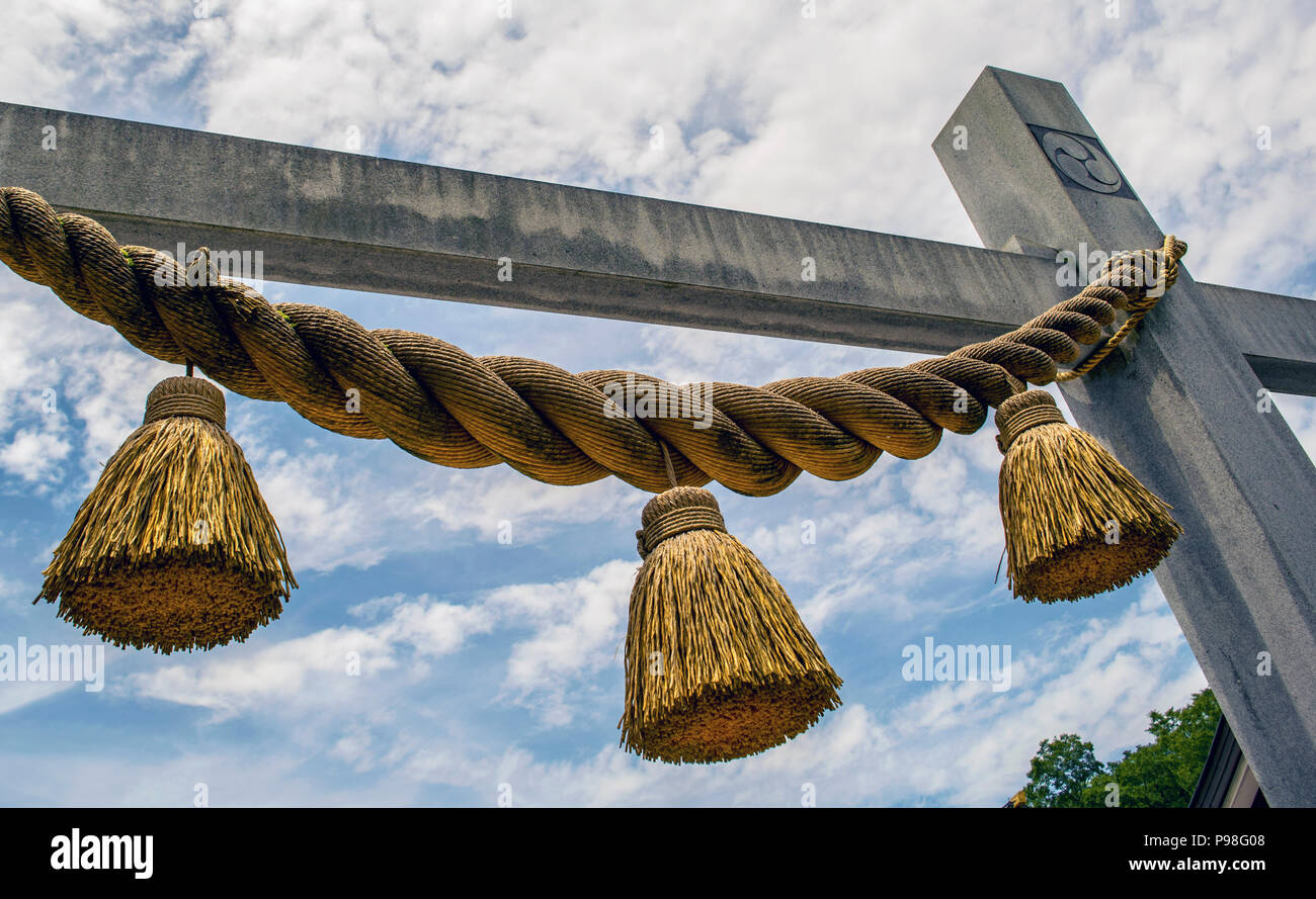 Shinto gate cord Stock Photo - Alamy