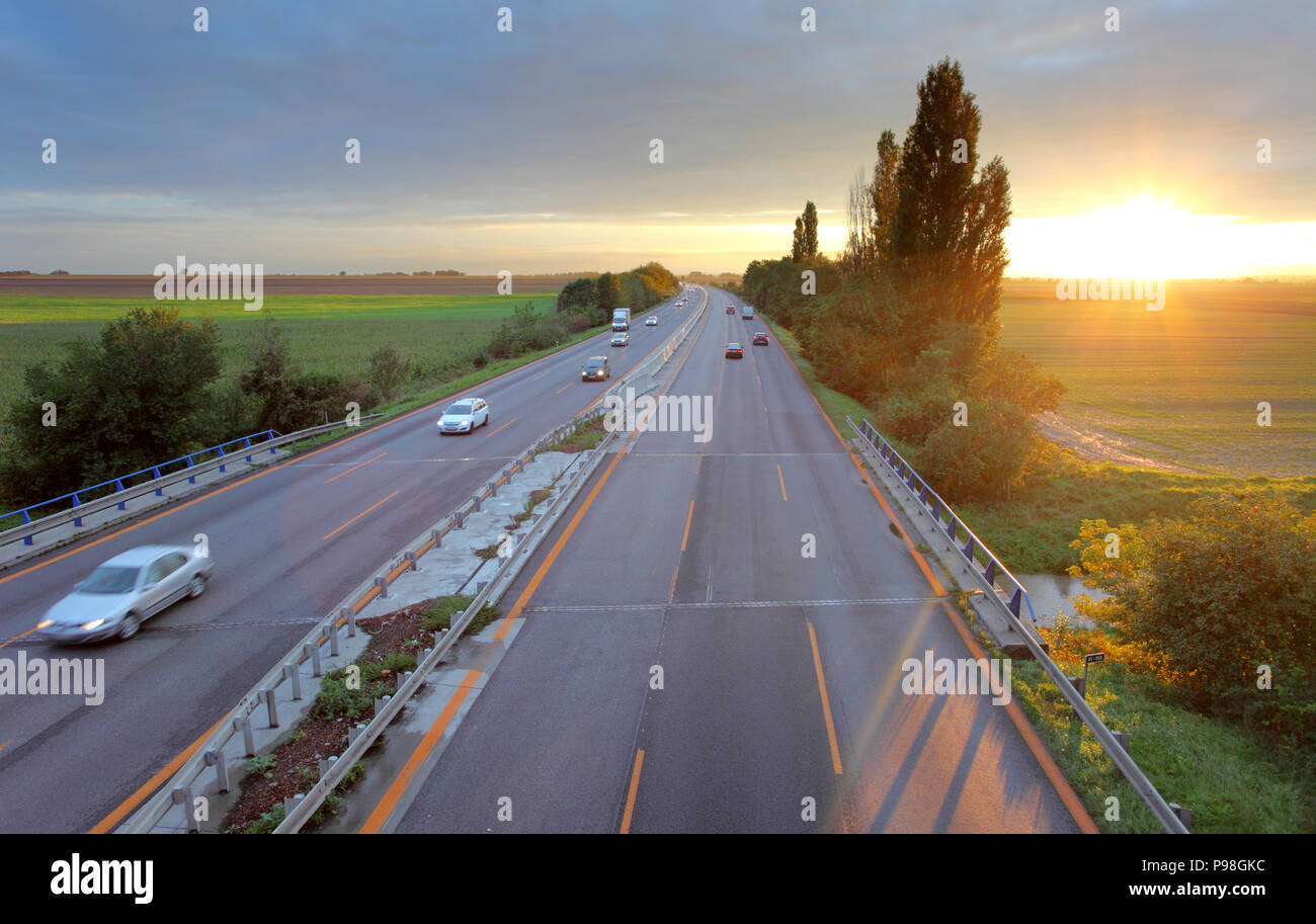 Higway road with cars Stock Photo - Alamy