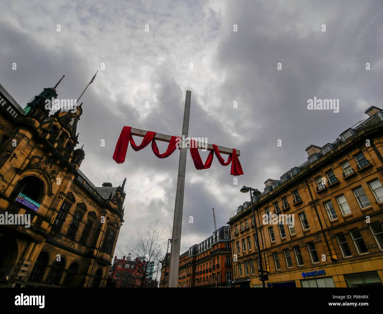 red robe draped over cross in Sheffield England Stock Photo - Alamy
