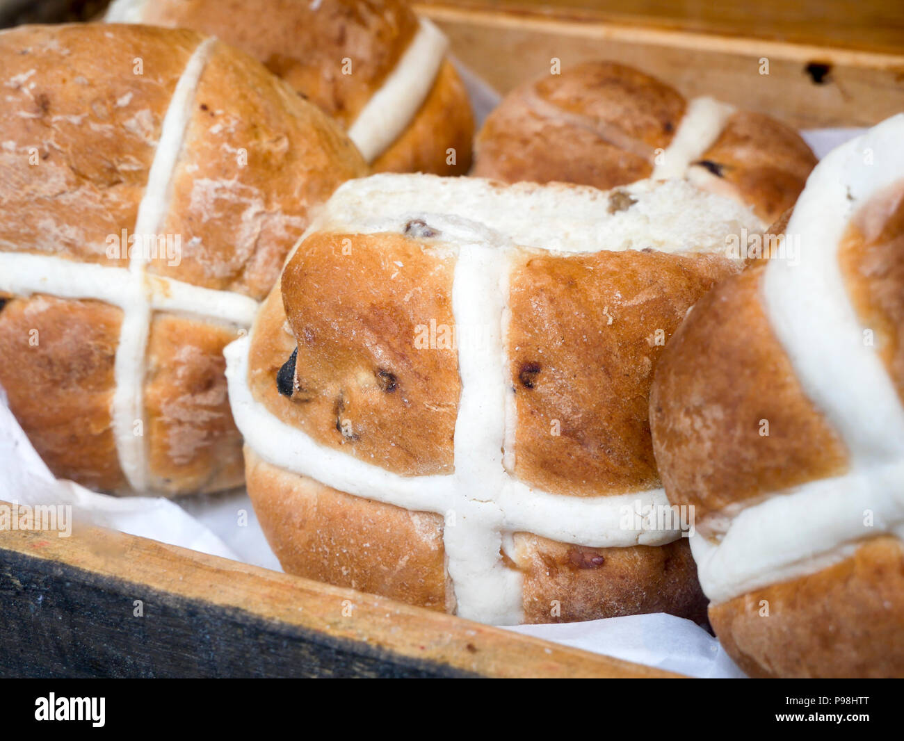 Hot cross buns on display in shop window Stock Photo - Alamy