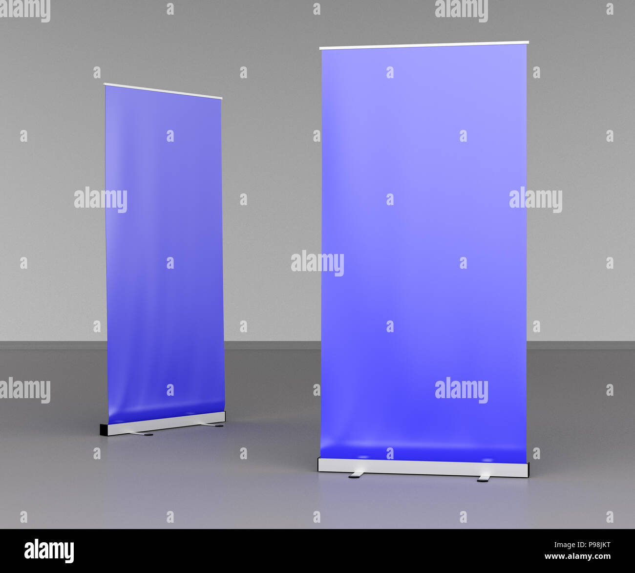 Blank blue roll up banner stands on gray floor. Include clipping paths ...