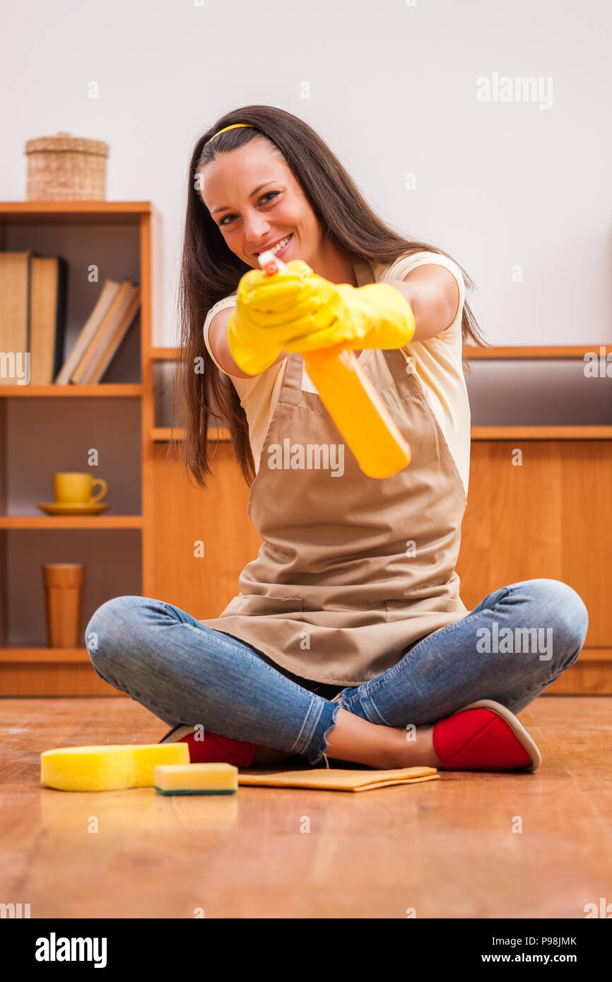 Young happy woman is ready to clean the house Stock Photo - Alamy