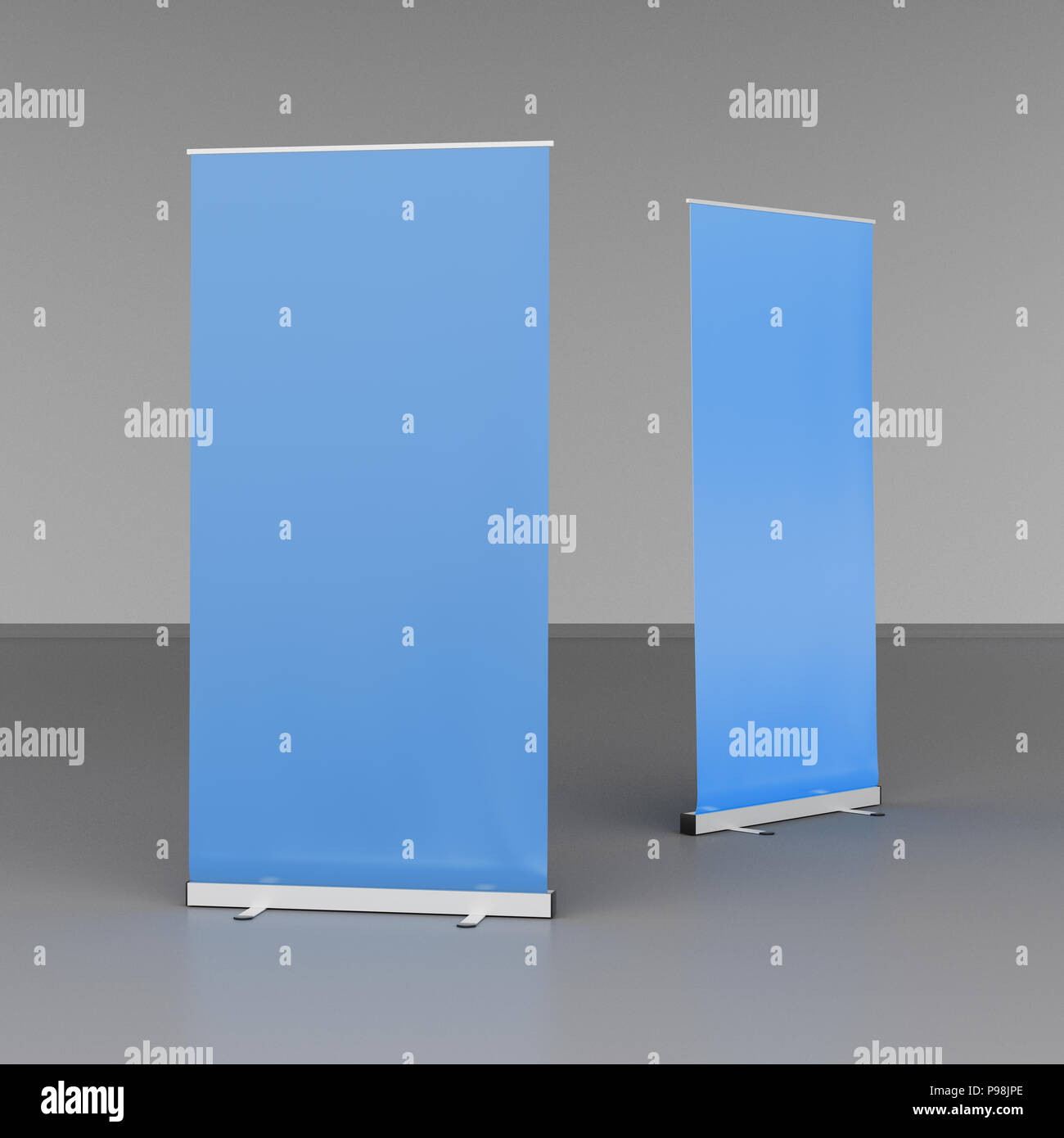 Blank cyan roll up banner stands on gray floor. Include clipping paths ...