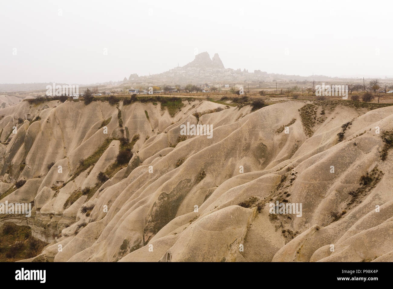 View of ancient castle of Uchisar from a mountains in Cappadocia ...