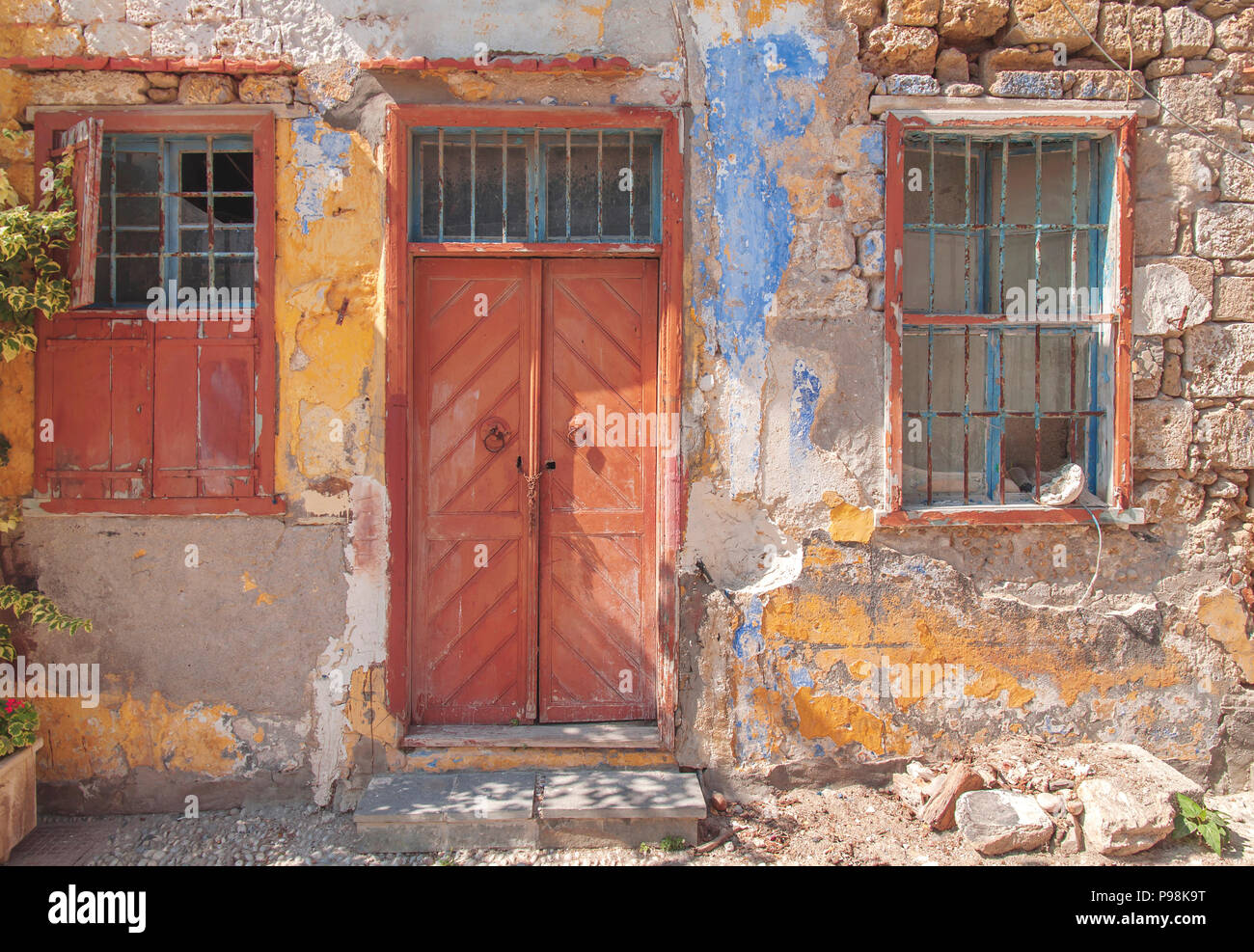 One door and two window at very old old dirty and rust home Stock Photo ...