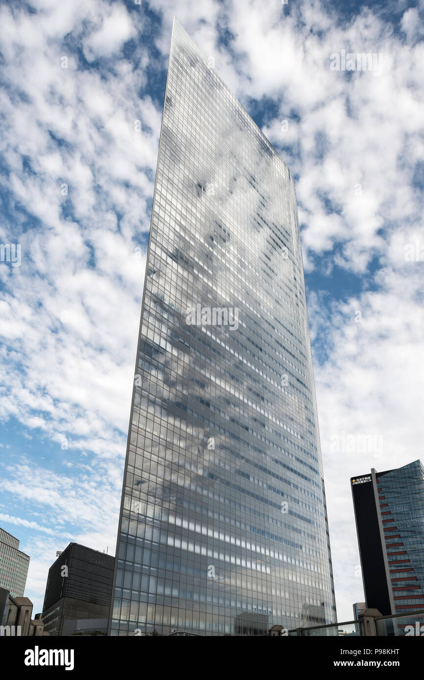 Dentsu Building with clouds. Shiodone, Tokyo, Japan Stock Photo - Alamy