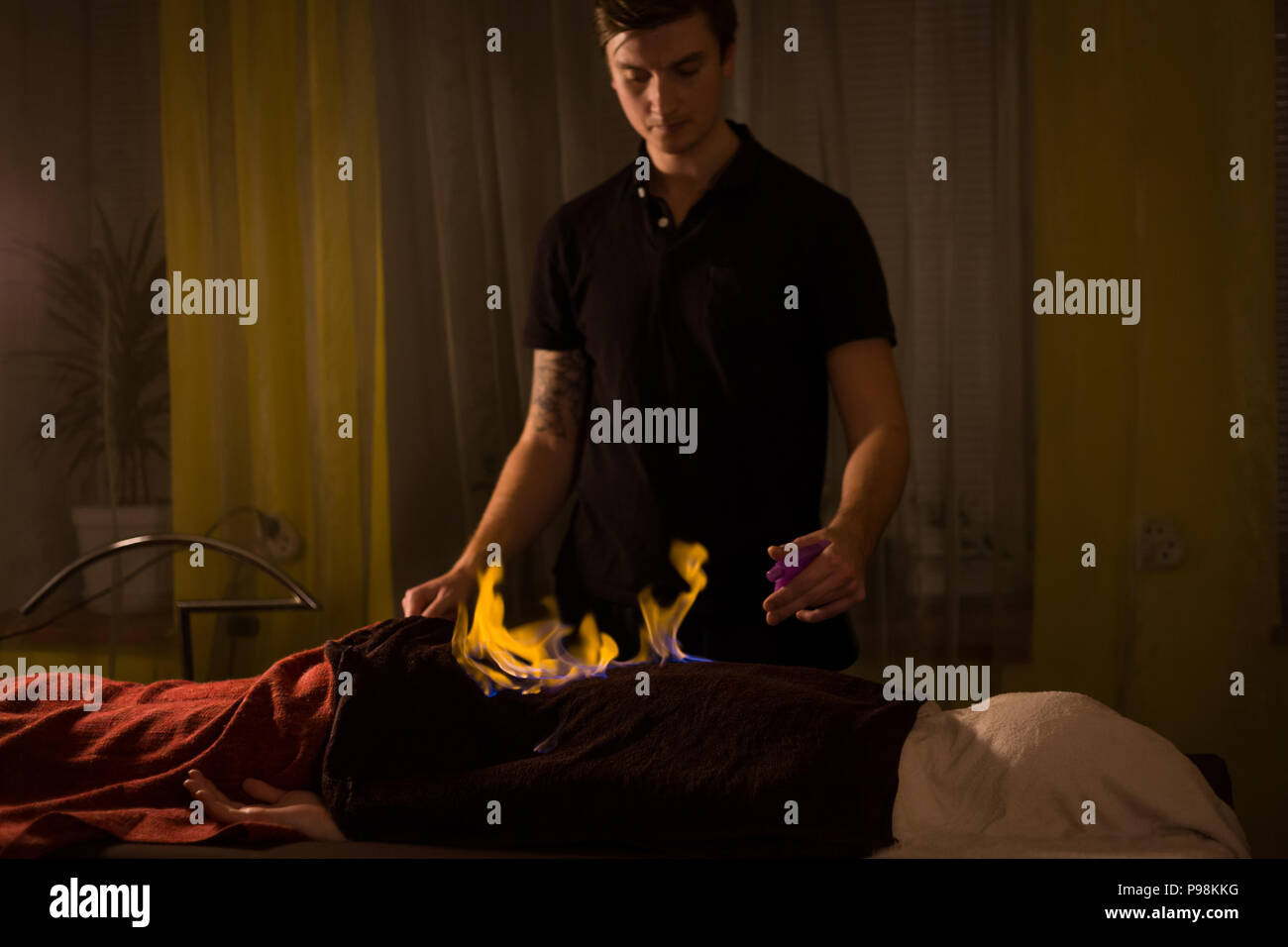 Chinese fire massage and therapy Stock Photo - Alamy