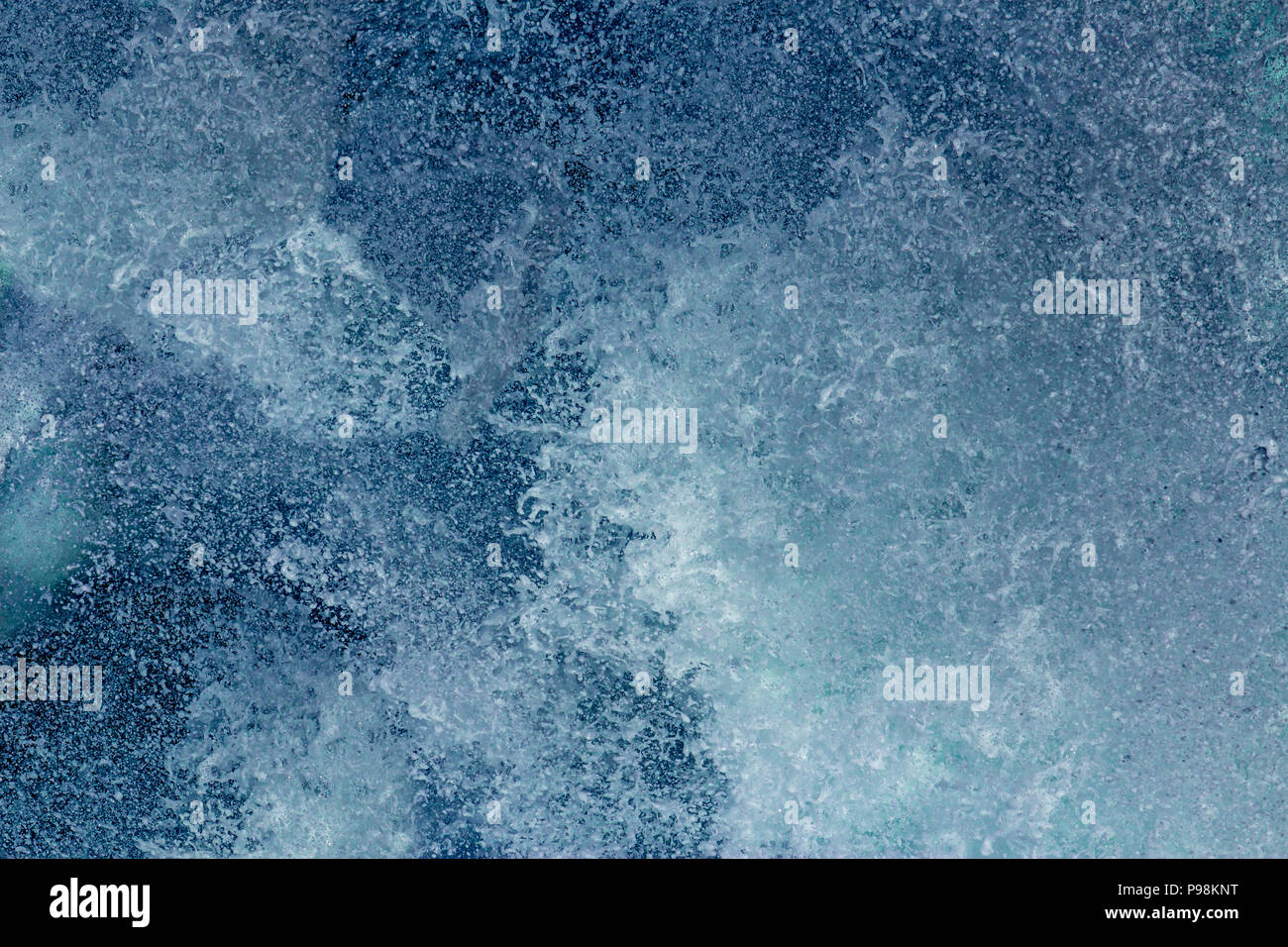 Aquatic background of sea surf waves close up with clear water and ...