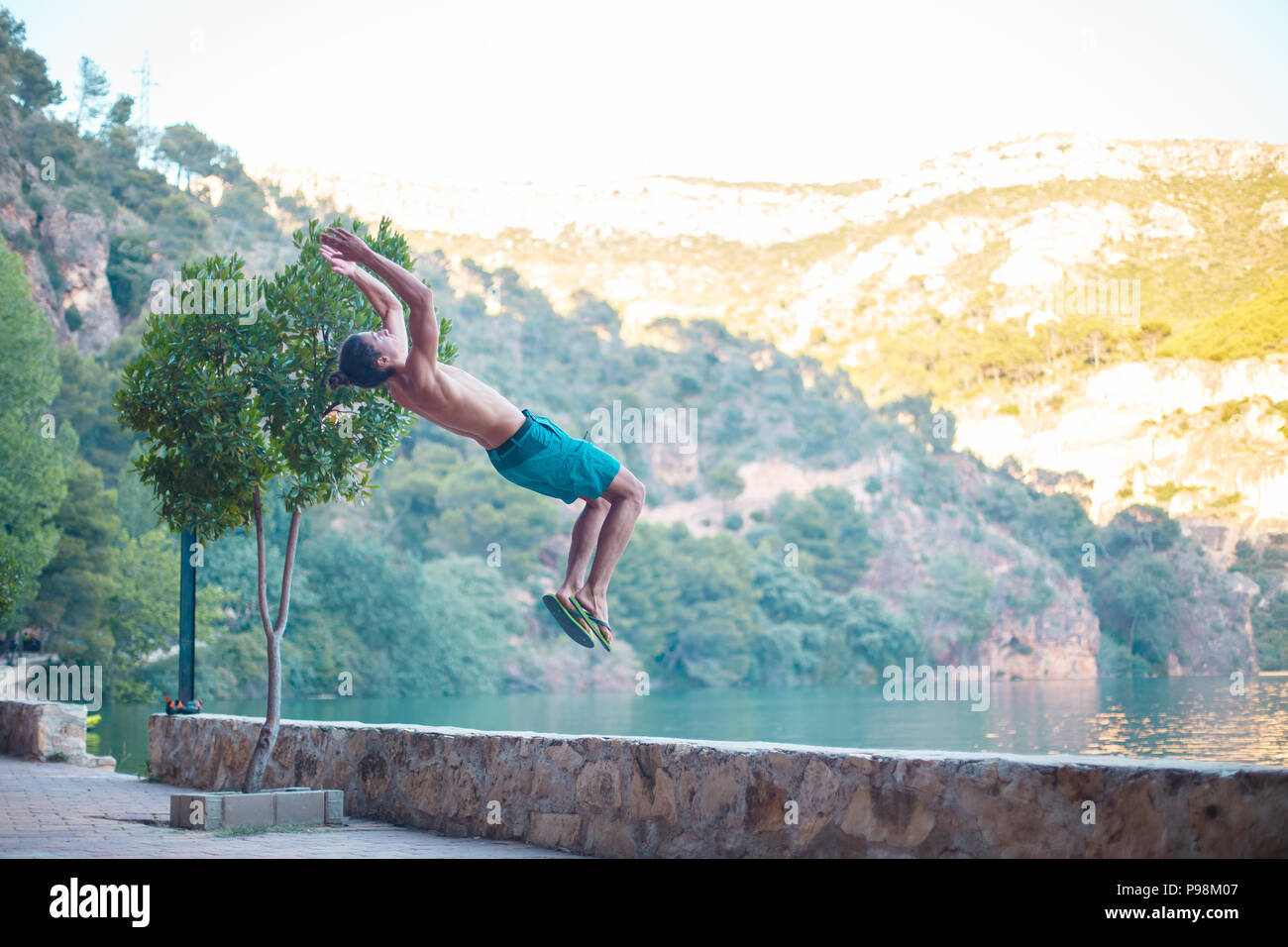 Boy doing somersault hi-res stock photography and images - Alamy