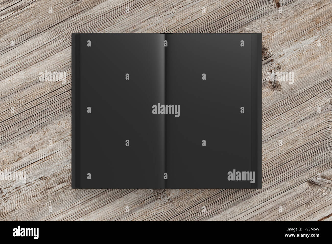 Open book with black cover and blank black pages isolated on wooden ...