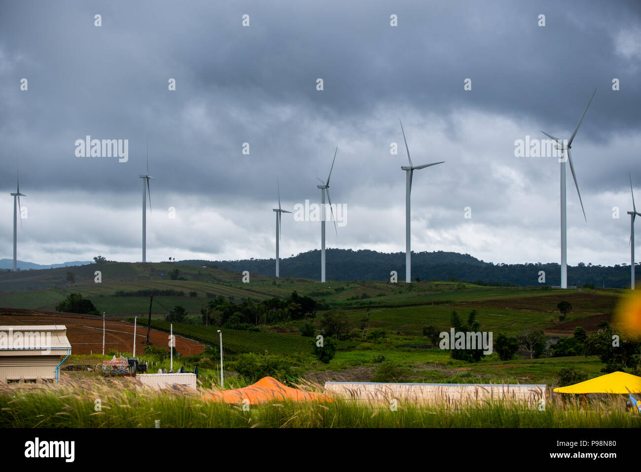 turbine farm with incoming thunder storm Stock Photo - Alamy