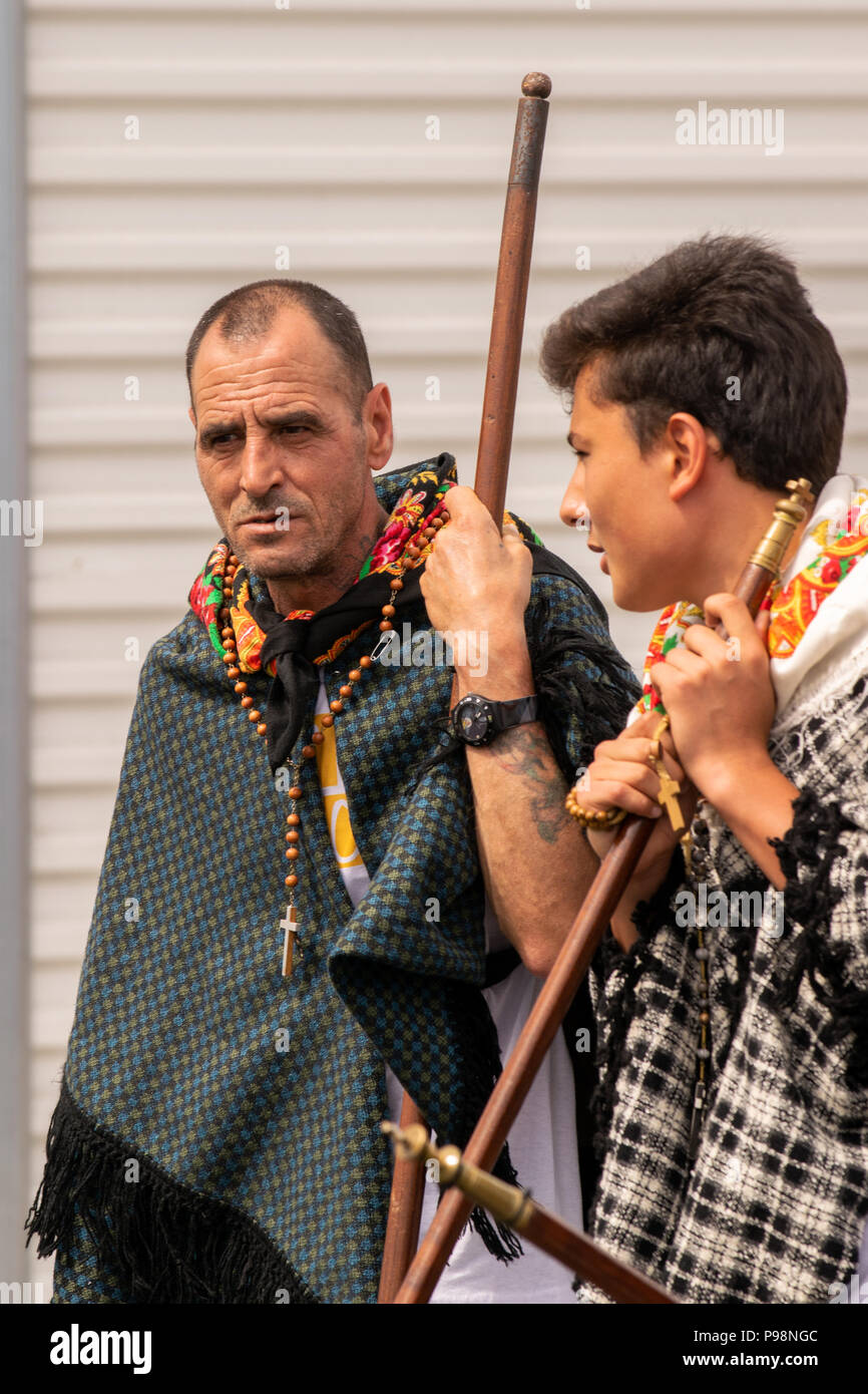 Ponta Delgada, Azores, Portugal - 07/07/2018 - two men praying in ...