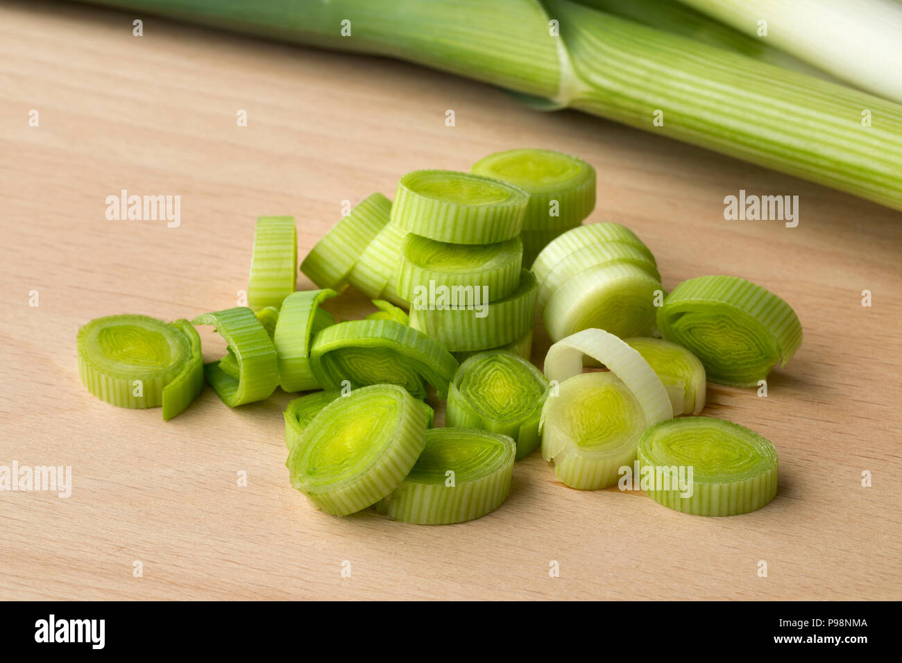 Heap of fresh slices of raw leeks close up Stock Photo - Alamy