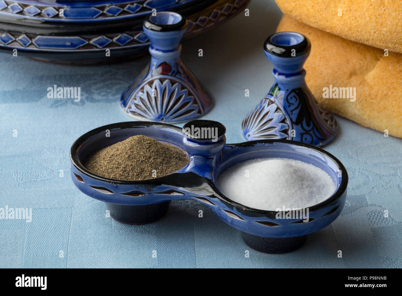 Traditional Moroccan pepper and salt set ready for a meal Stock Photo ...