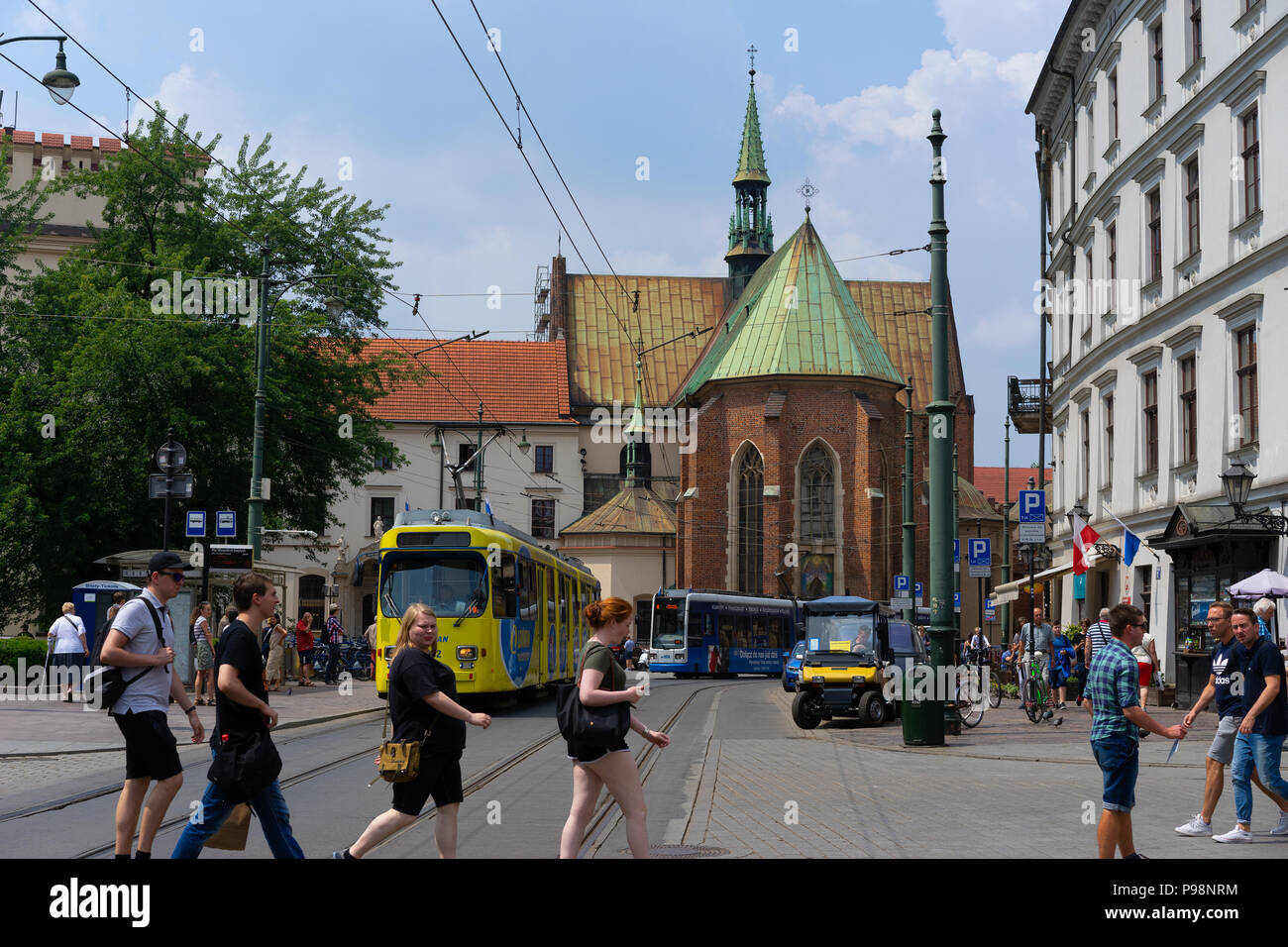 people crossing a busy street in Krakow, Poland, Europe Stock Photo - Alamy