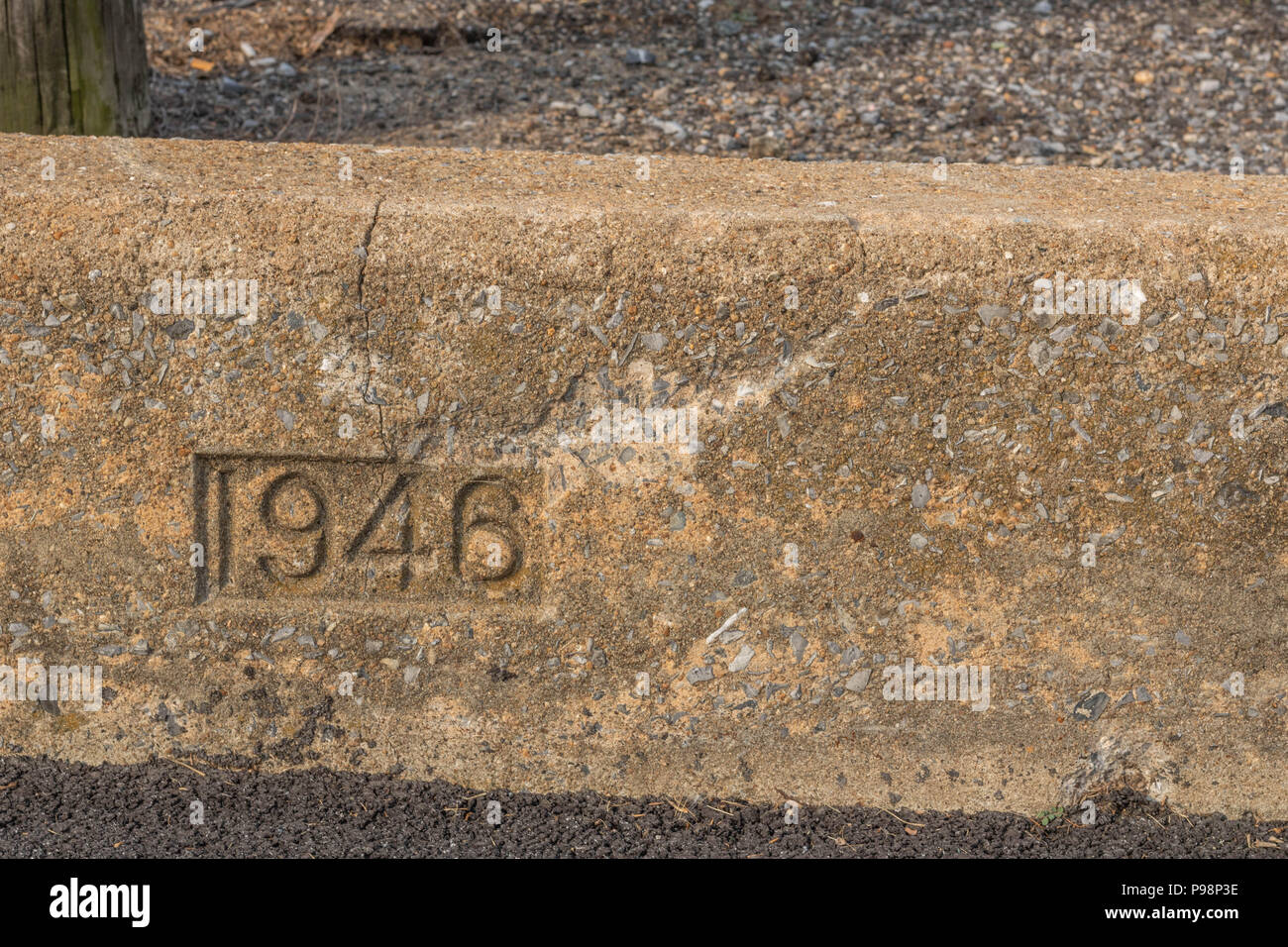 the year 1946 stamped in the concrete Stock Photo - Alamy