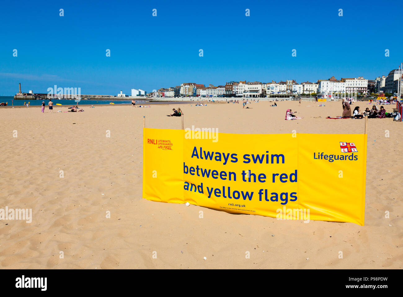 RNLI Lifeguards safe swimming sign on beach at Margate, Kent, UK ...